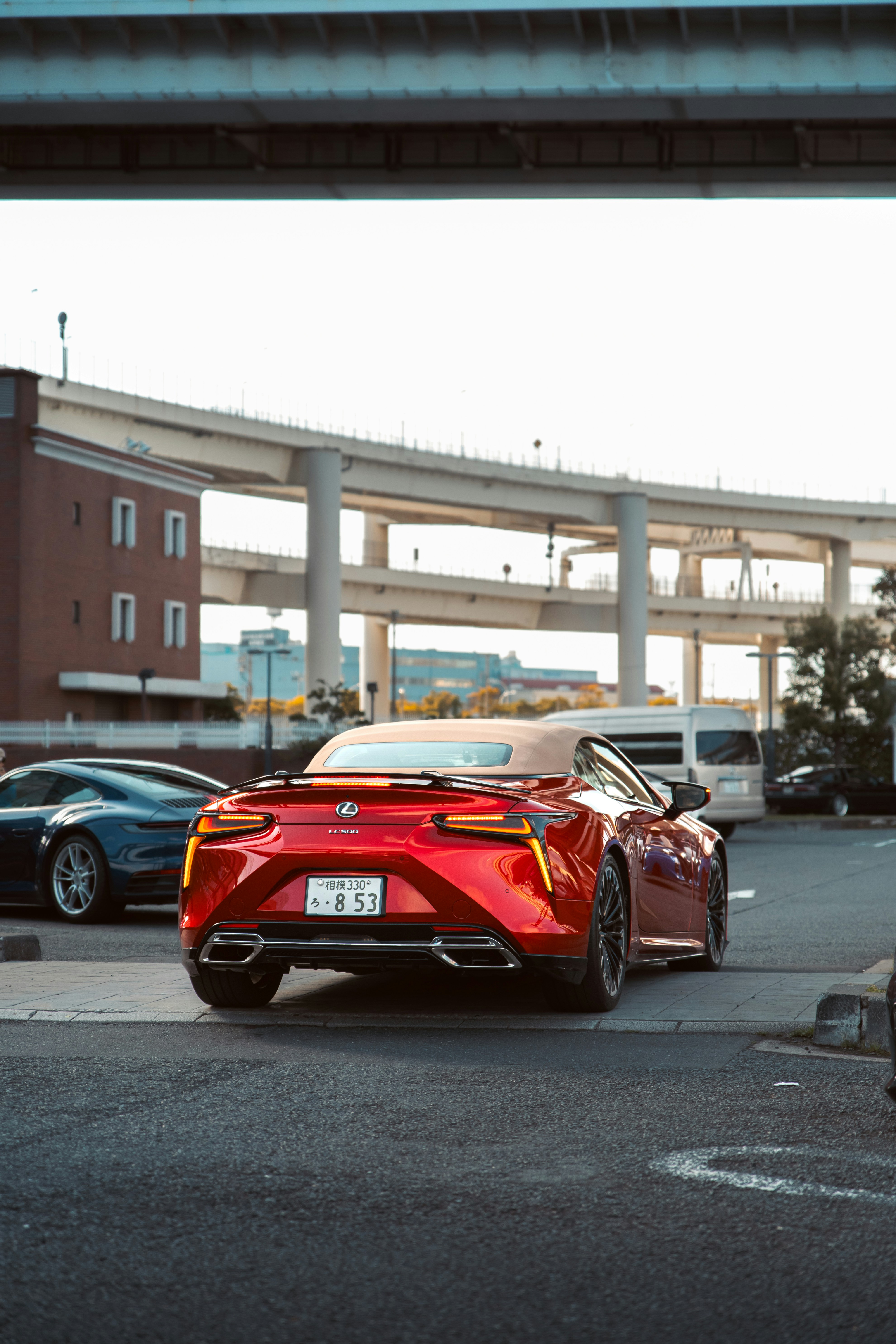 Red convertible lexus parked on street photo – Free Car Image on Unsplash