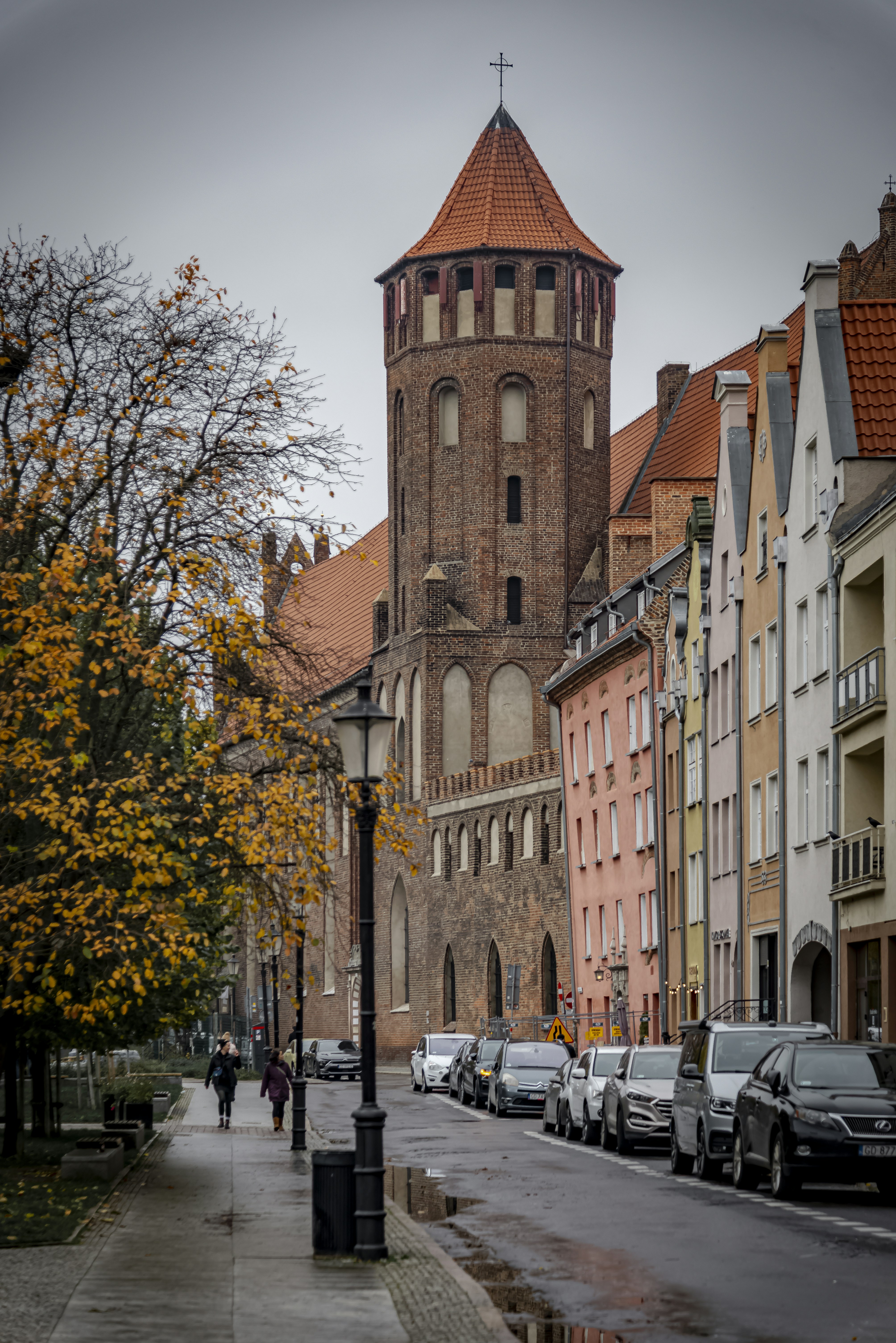 Towered Street: A Narrow Lane Leads the Eye to the Ancient Brick Clocktower