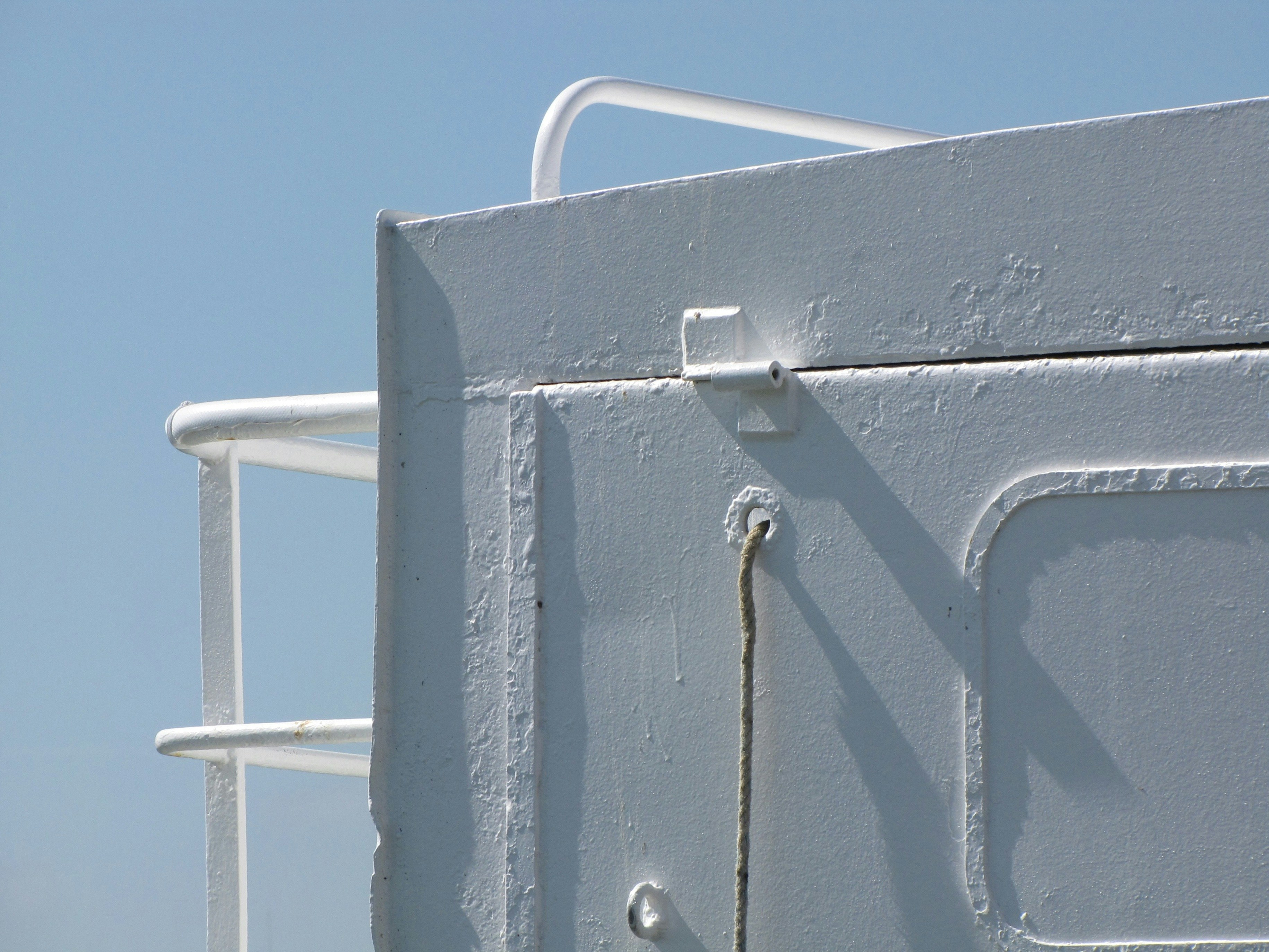 Rugged Dock Gate in Sunlit Sea Wind