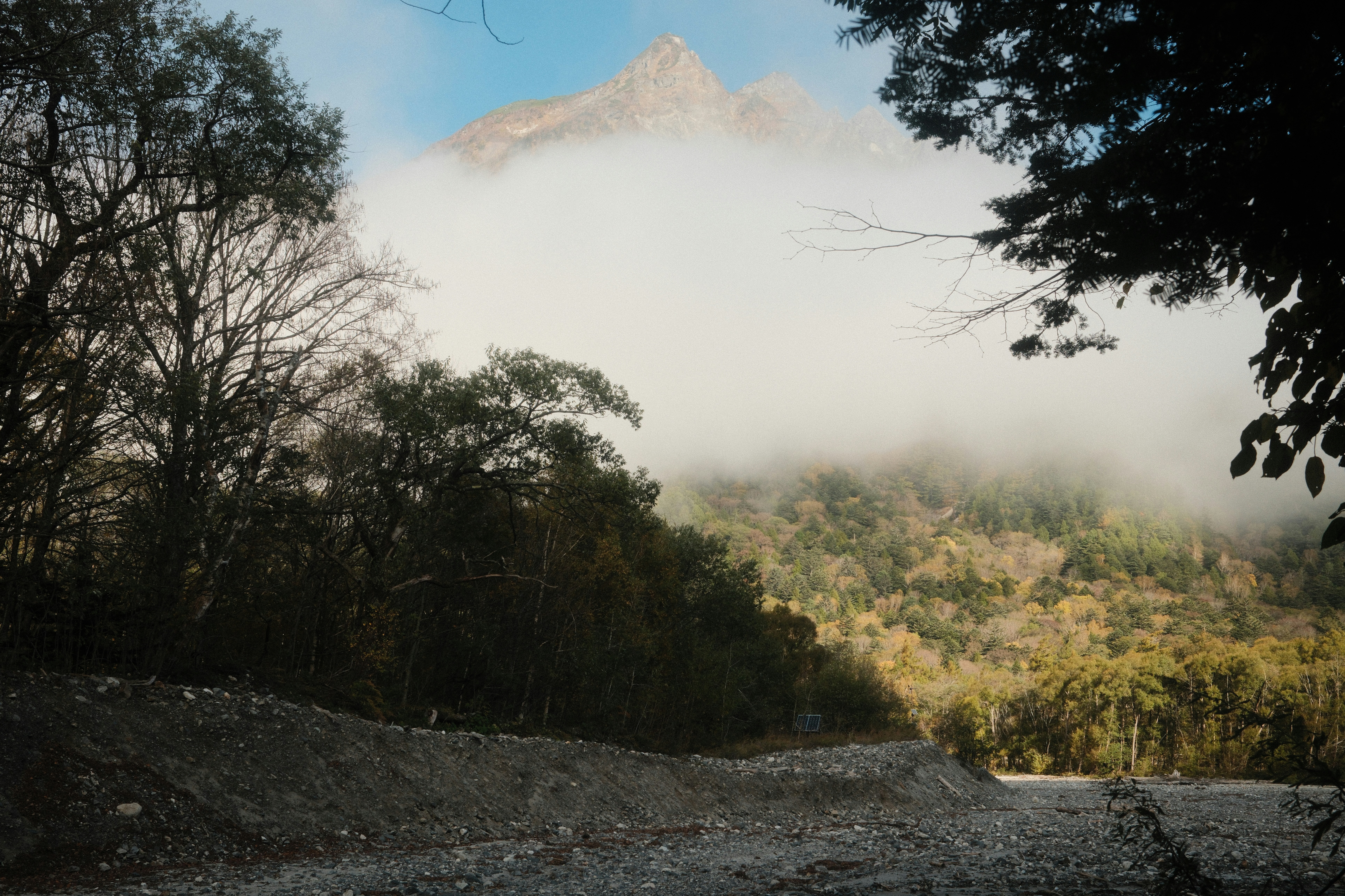 Veil of Mist Over Mountainous Serenity