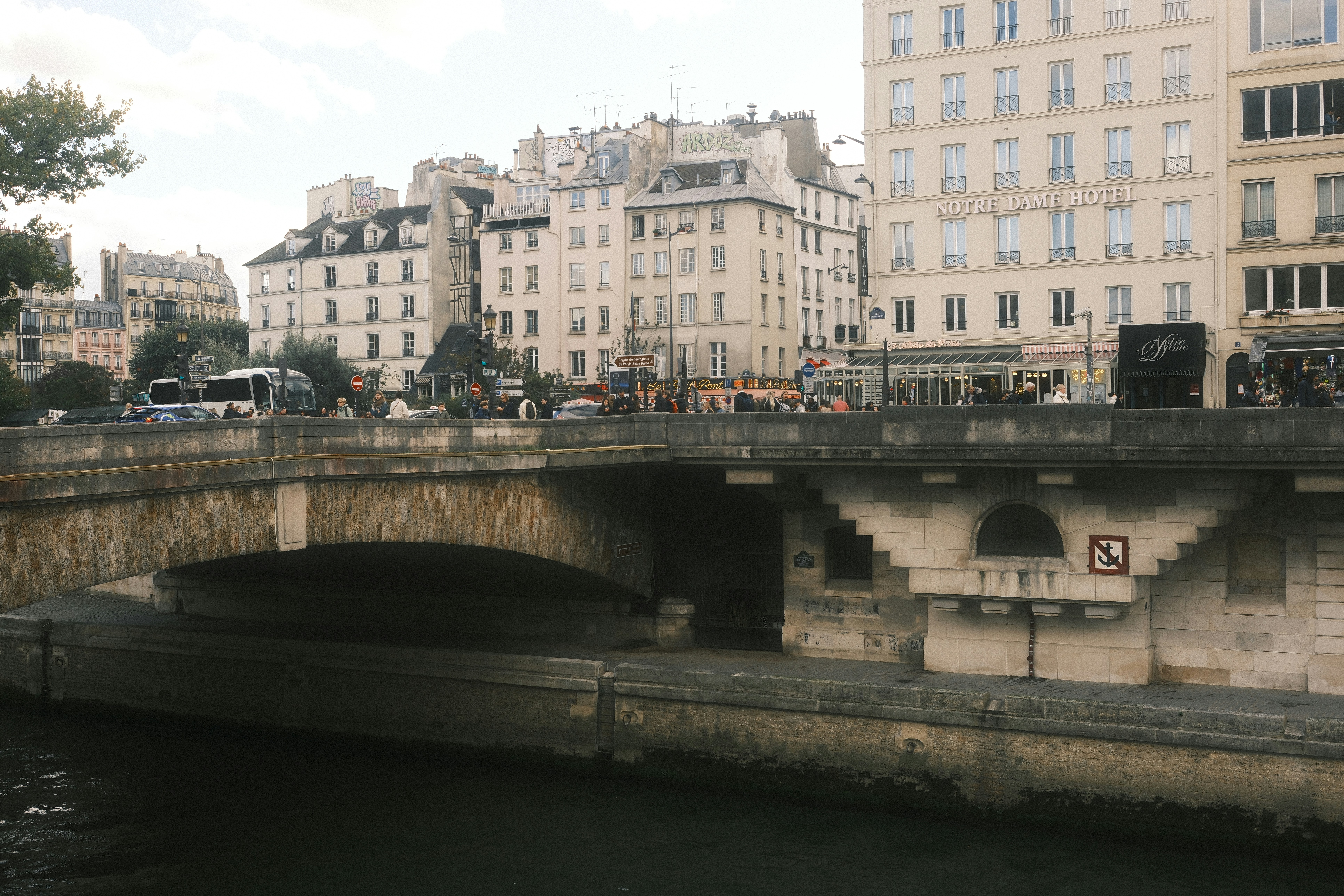 Urban Serenity: A Glimpse of Parisian Life by the Seine