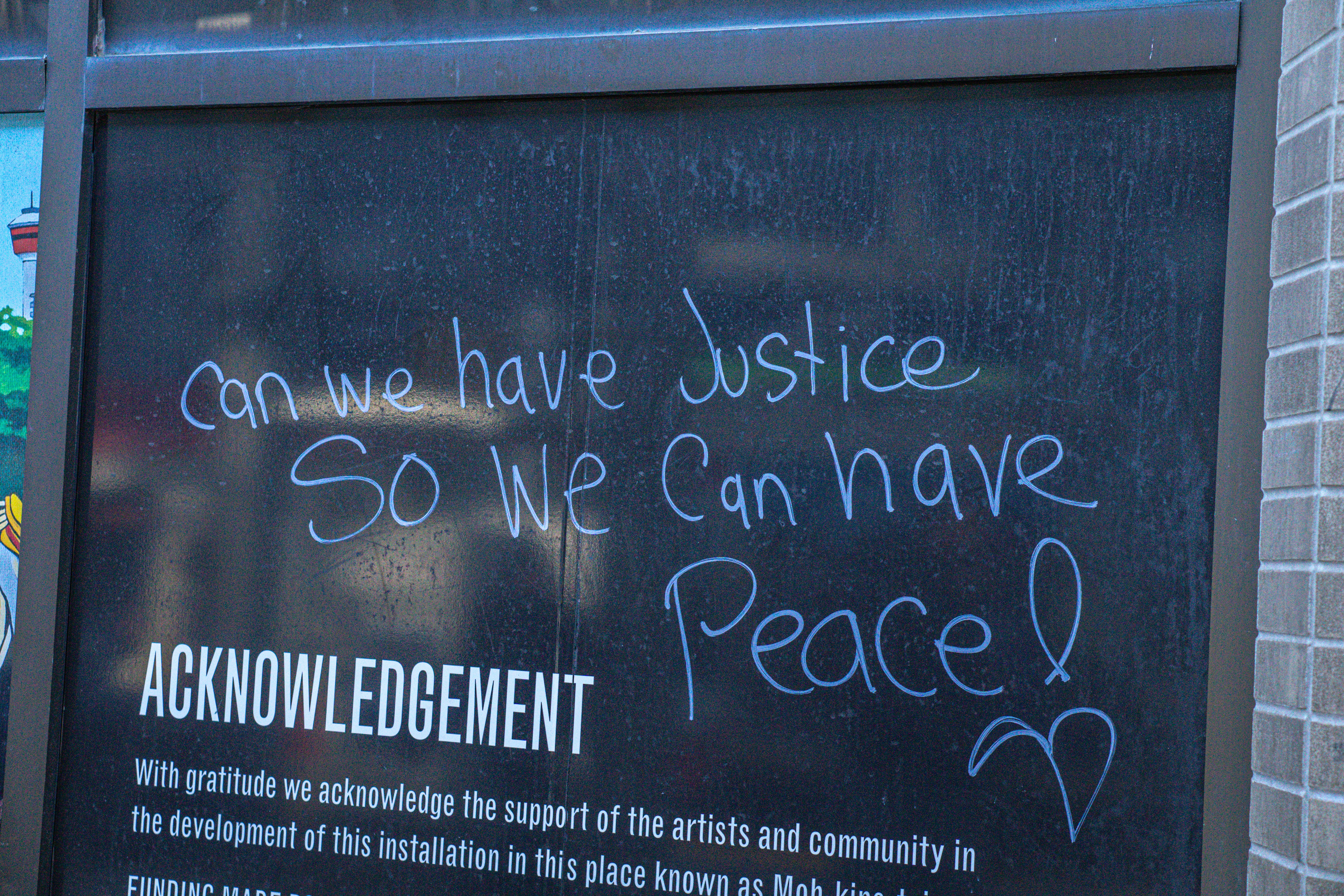 Justice on Glass: A Graffiti Manifest of Peace