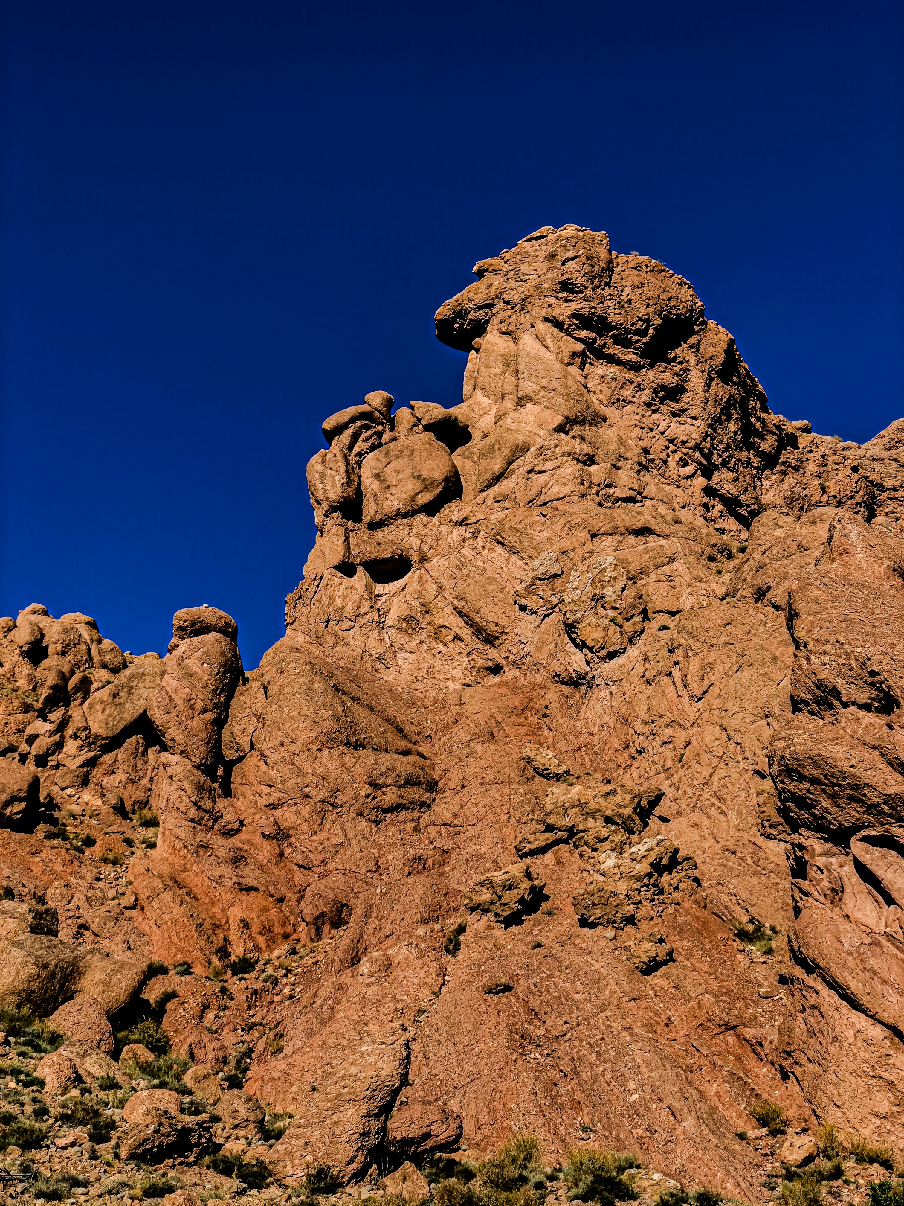 Rocky mountain formation against a clear blue sky