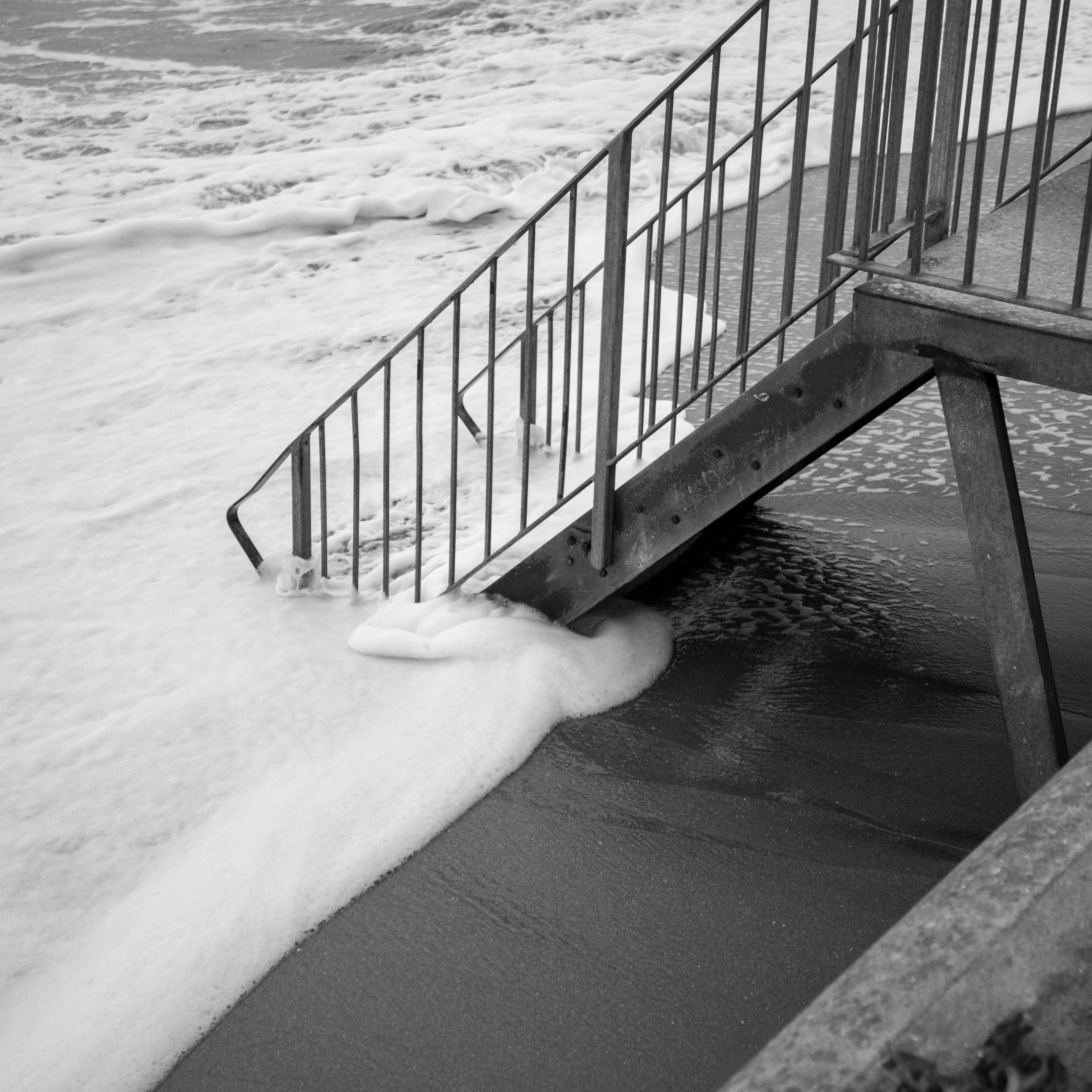 Steps to the Shore: A Monochrome Journey
