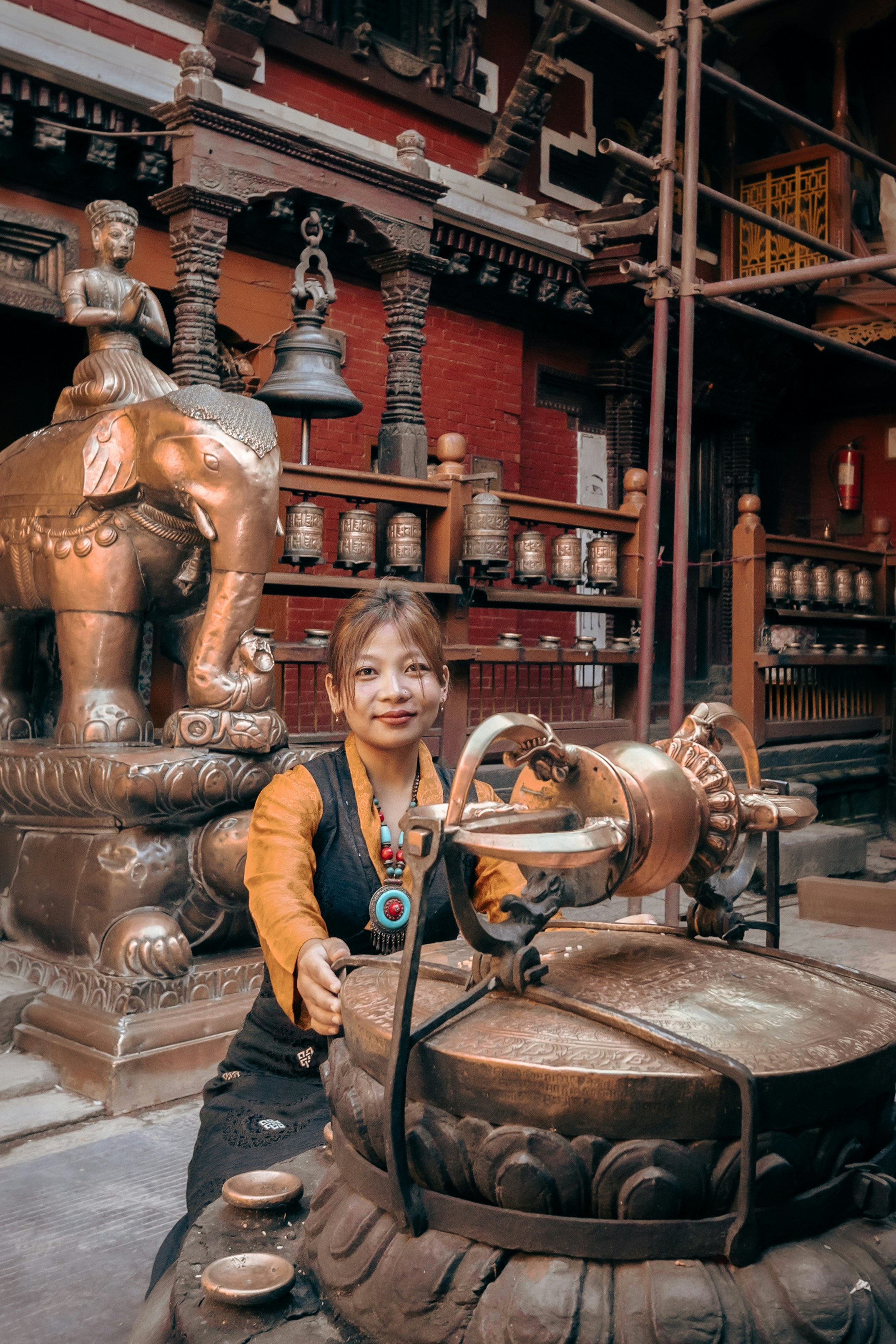Bronze Gears and Quiet Grace: A Temple Portrait by the Workbench