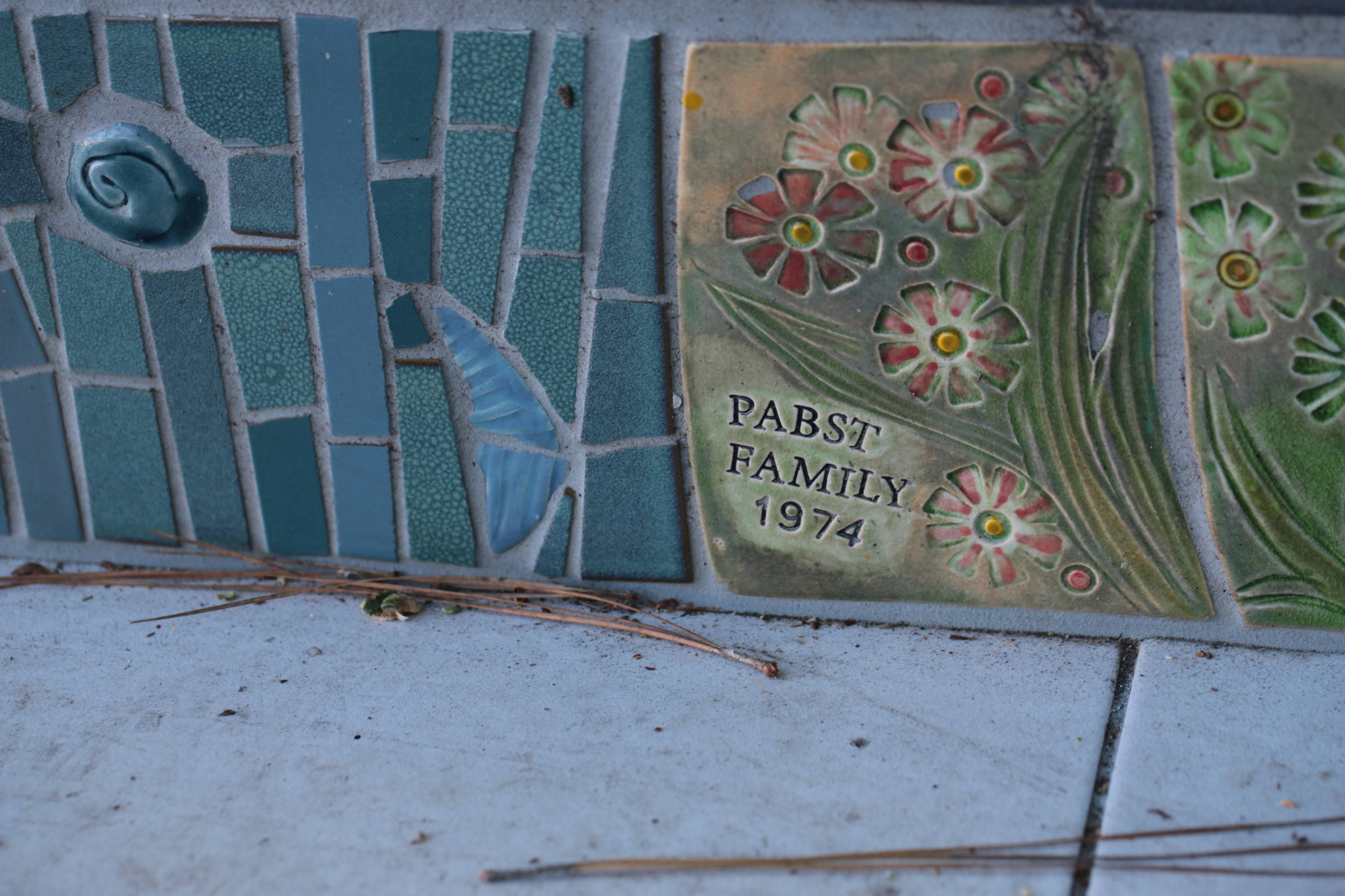 Mosaic art with flowers and text "pabst family 1974"