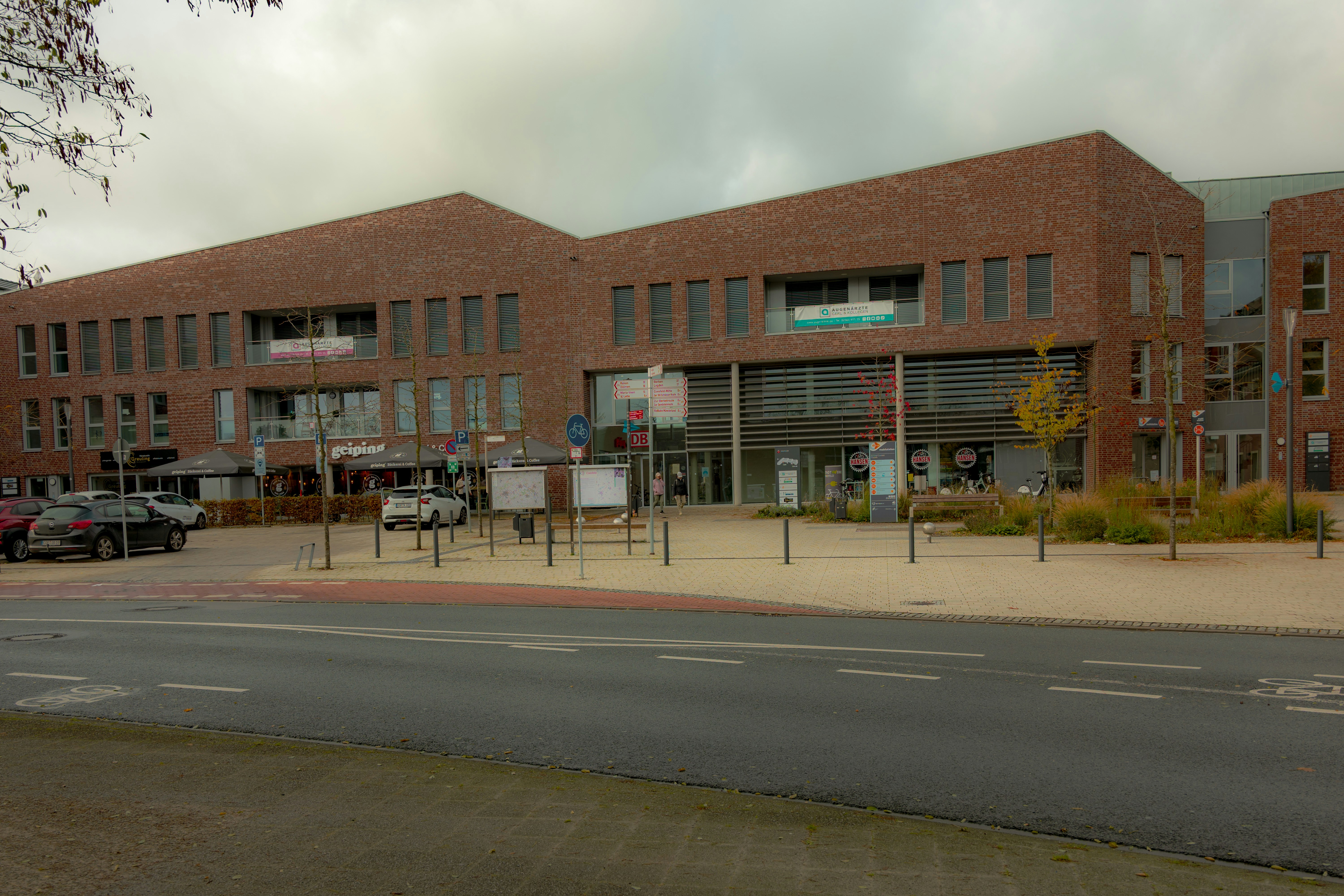 Brickline Storefronts: A Quiet Urban Street Under Overcast Light