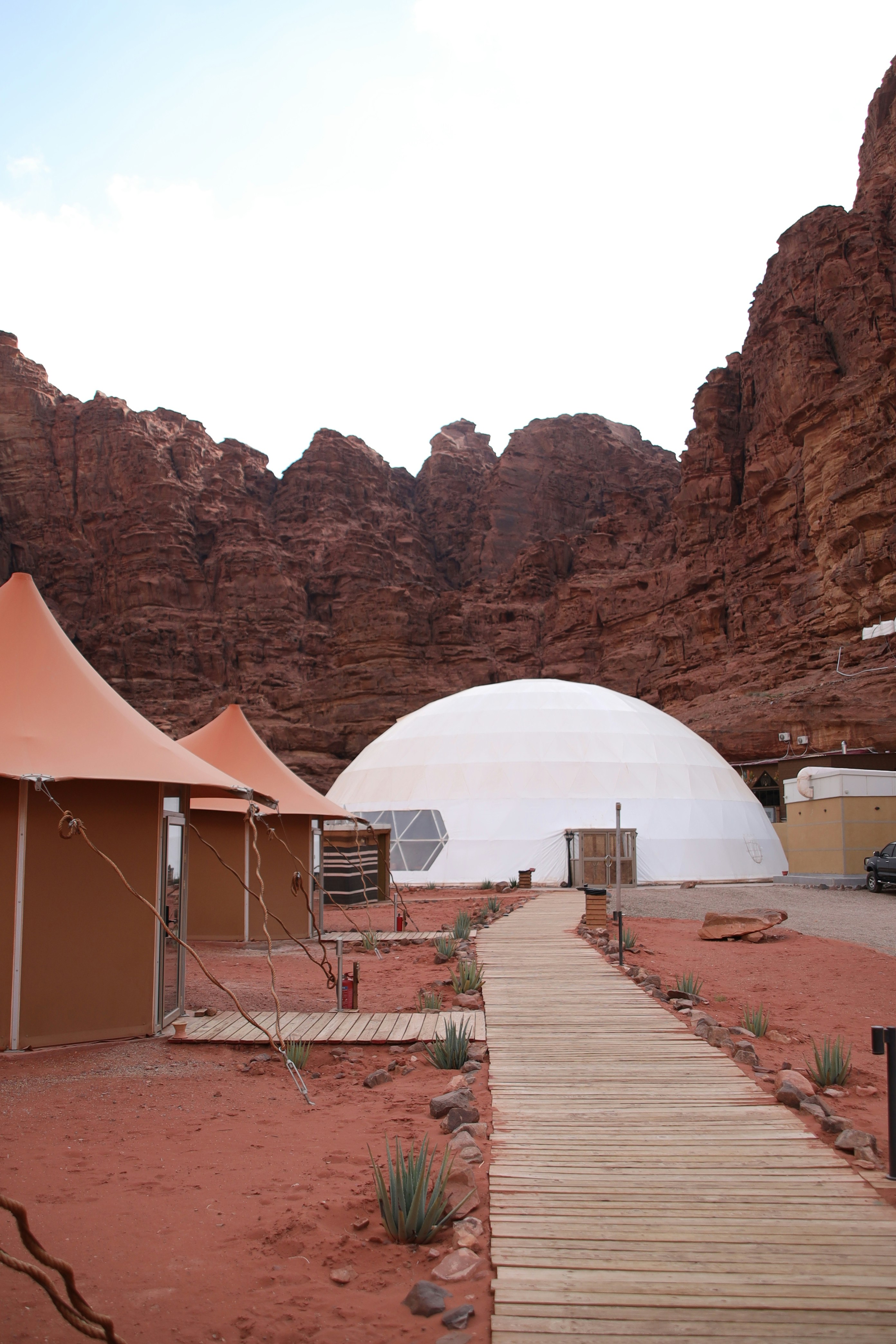 Geodesic Dome Camp Between Red Canyon Walls