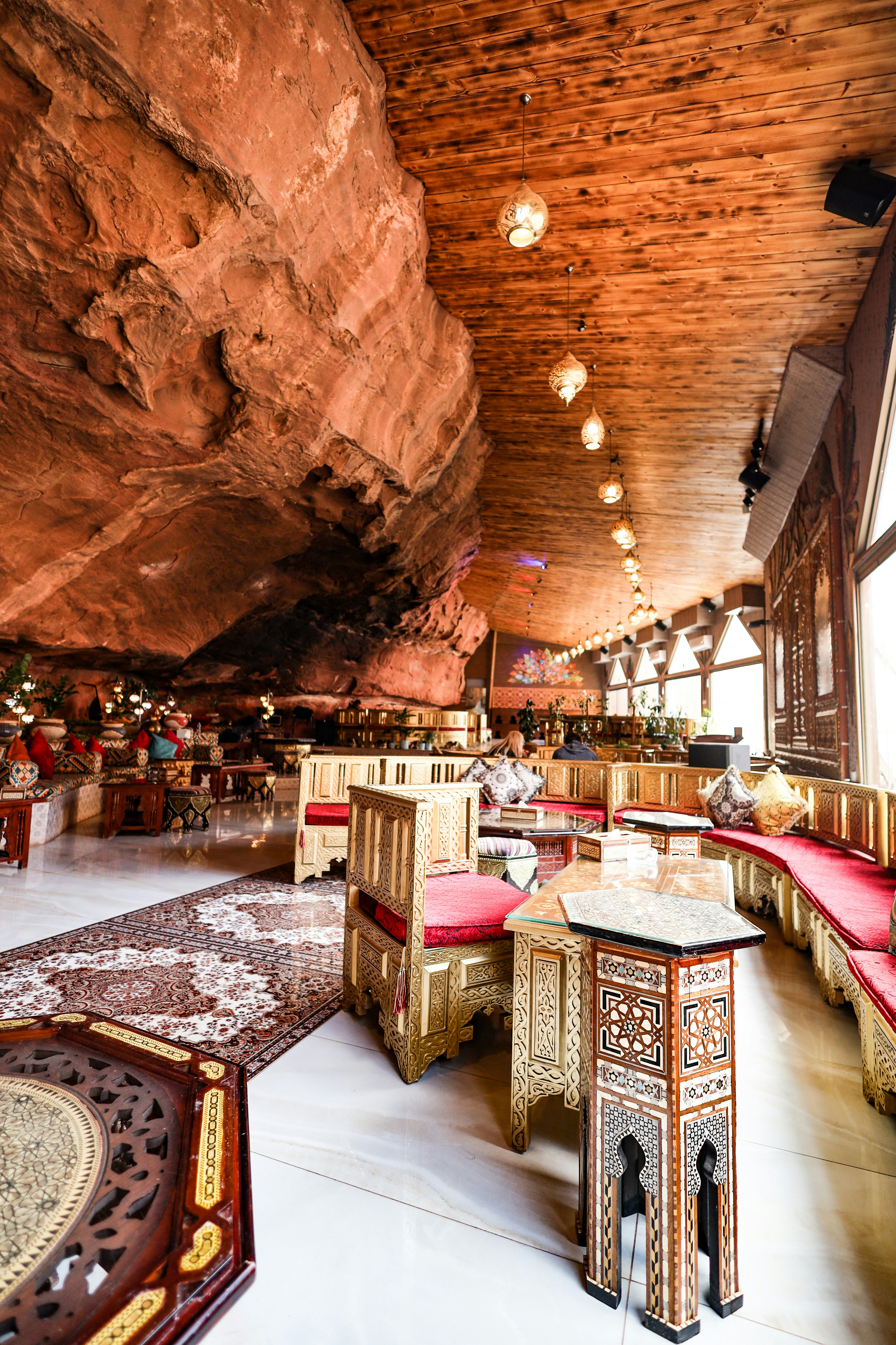Stone-Ceiling Café: Ornate Woodwork Lounge Carved Into Red Rock