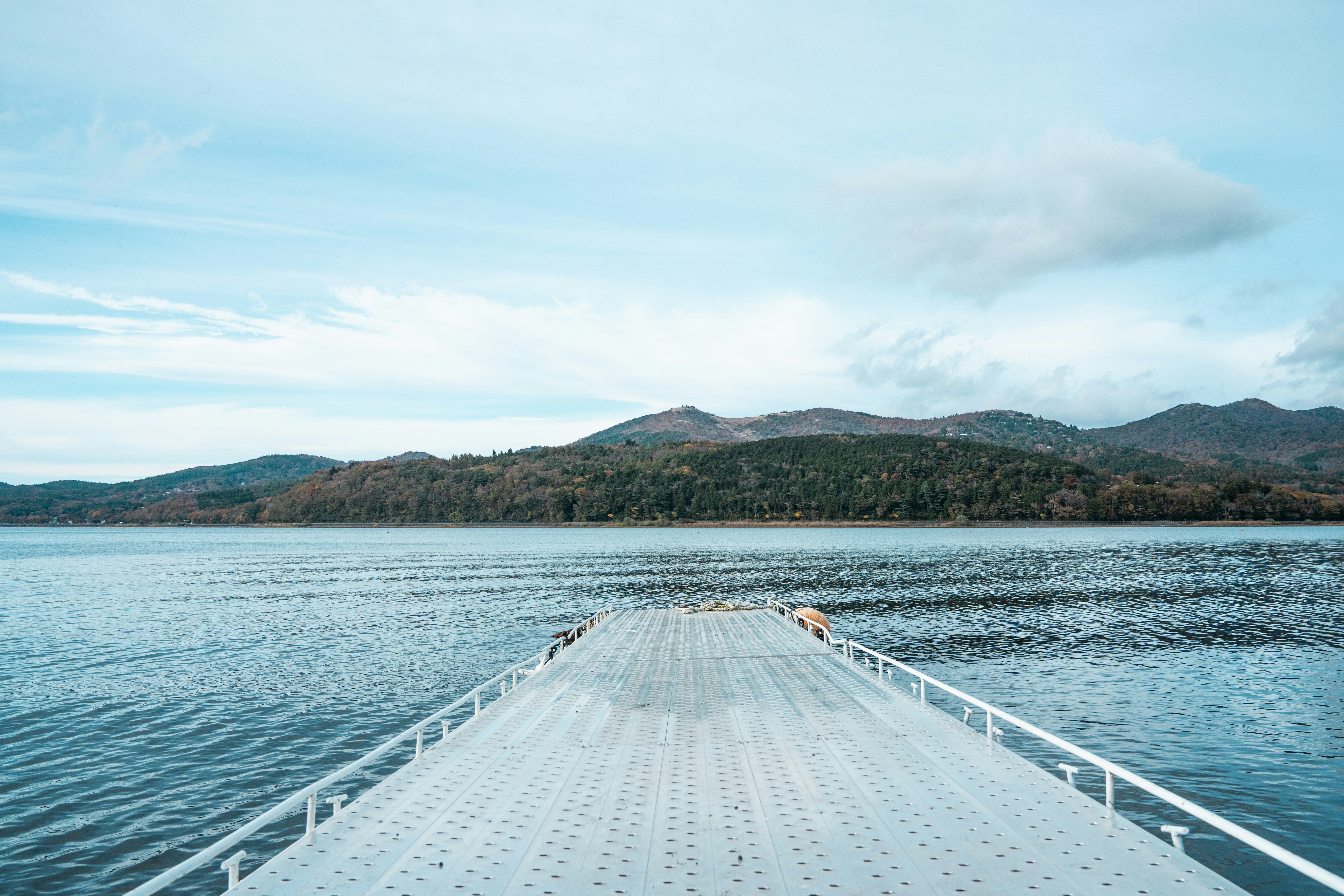 Converging Deck Toward Quiet Horizons: Pier to a Mountain Lake