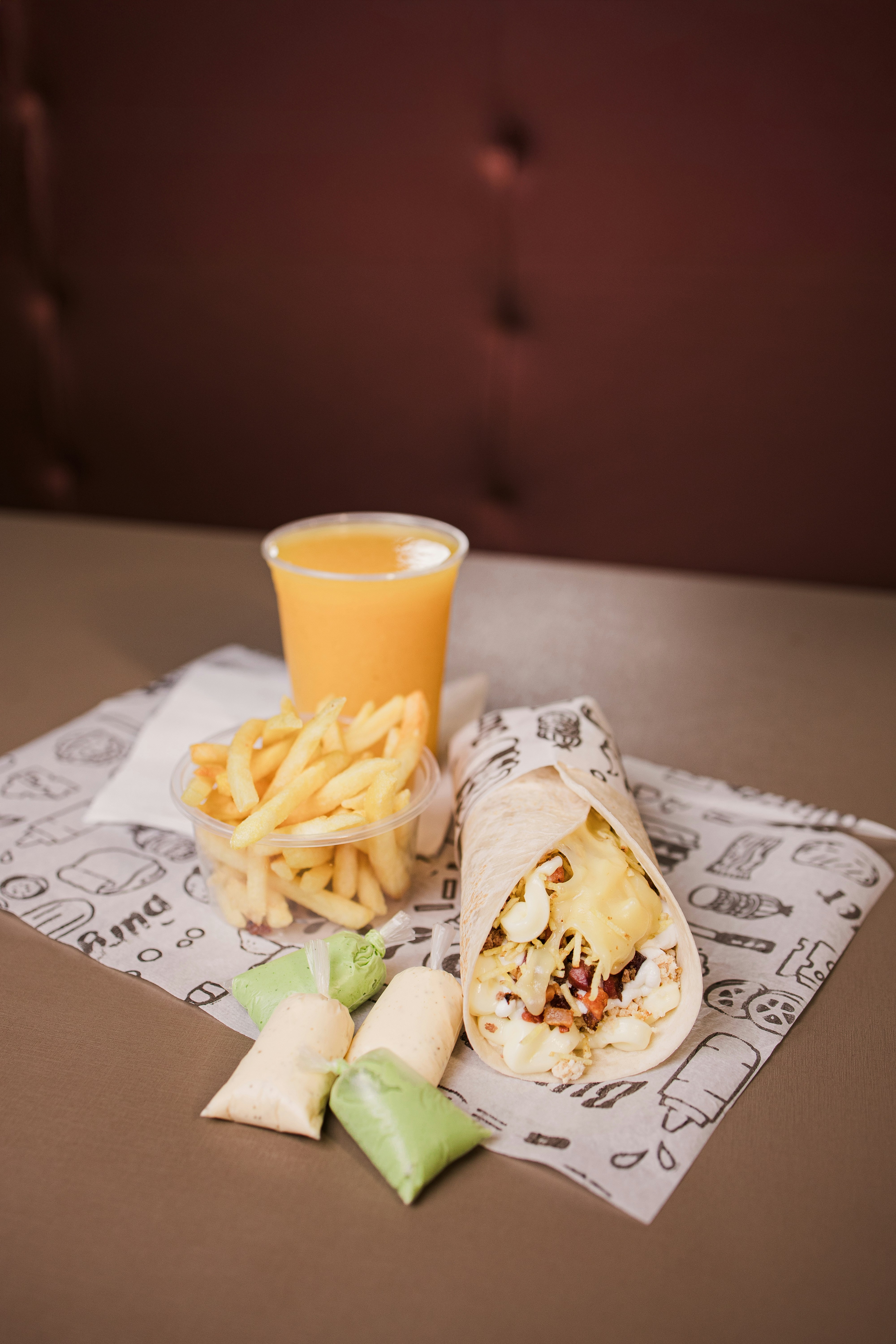 Golden Wrap Under Warm Spotlight: Casual Fast-Food Still Life