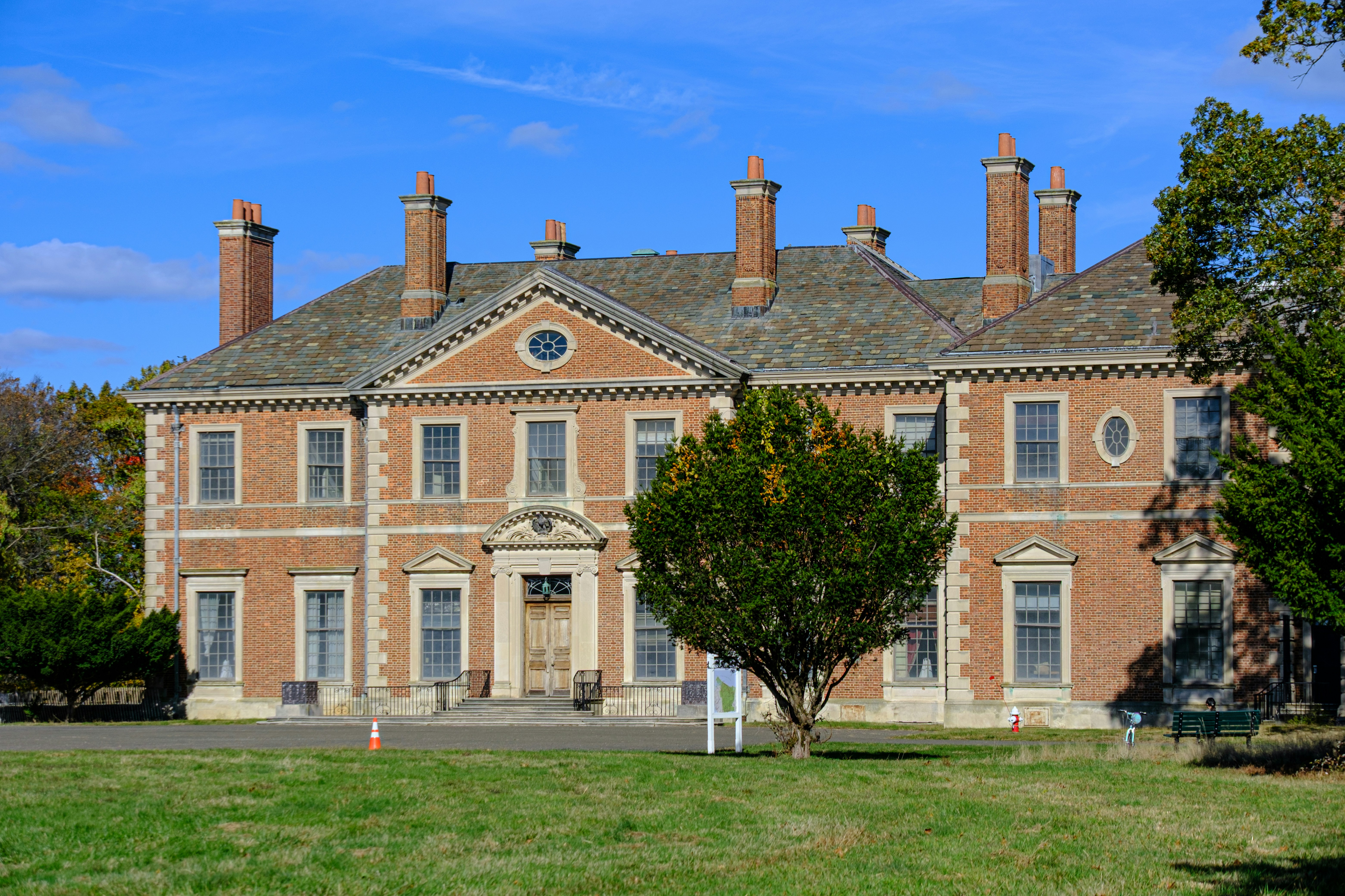 Georgian Manor: The Central Doorway in a Symmetrical Brick Facade