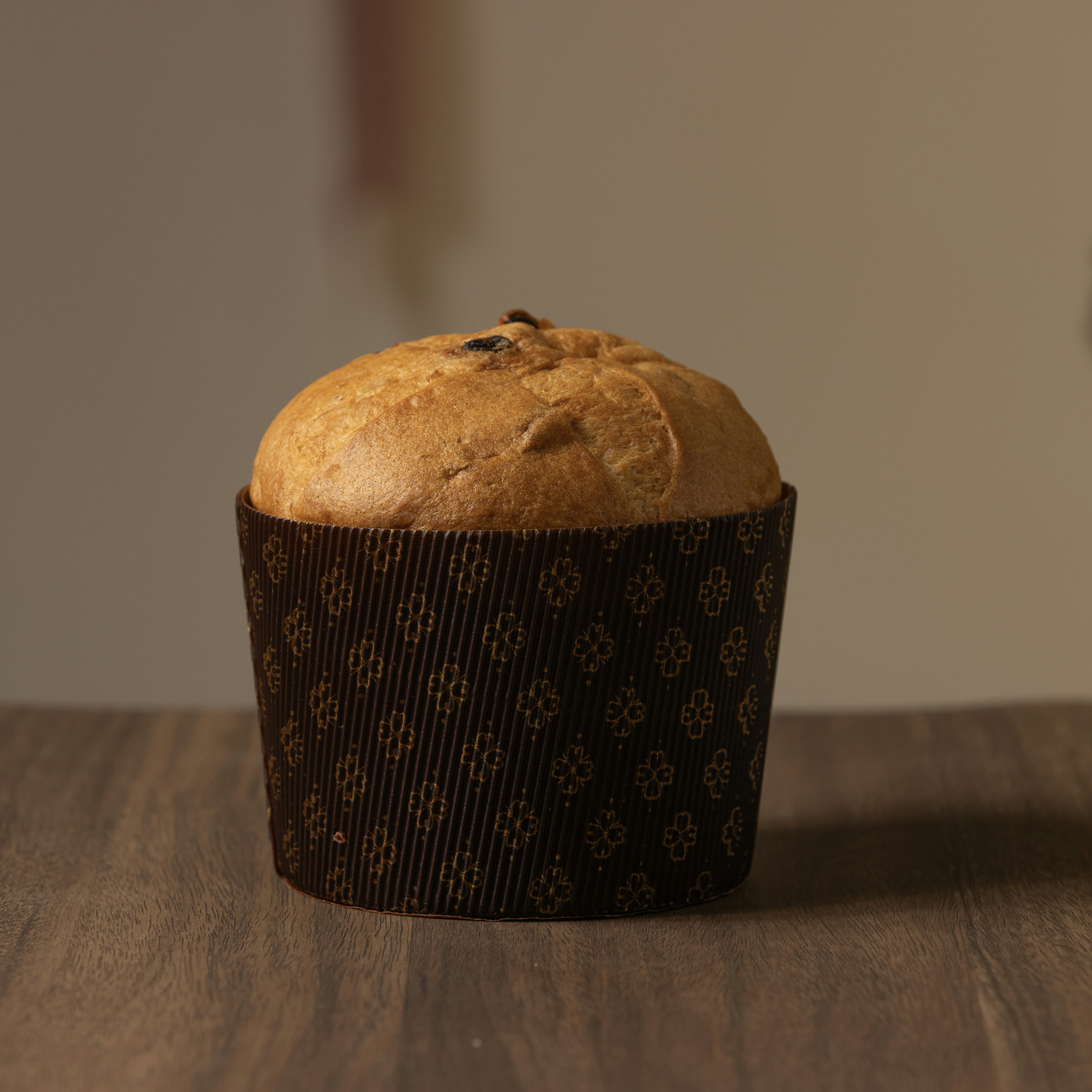 Golden Muffin Crown on a Rustic Wooden Stage