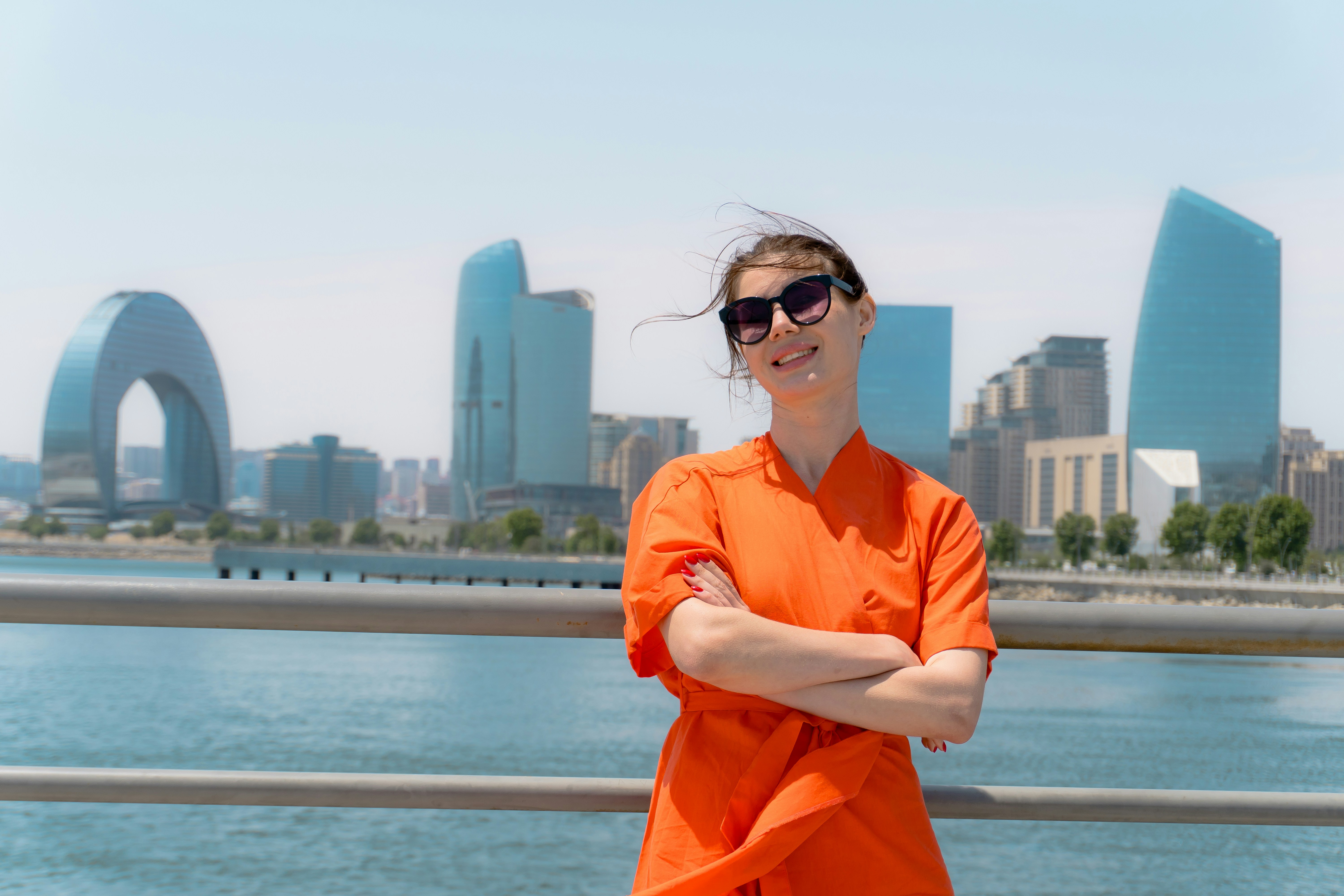 Orange Mask, Blue Harbor: Portrait on the Waterfront