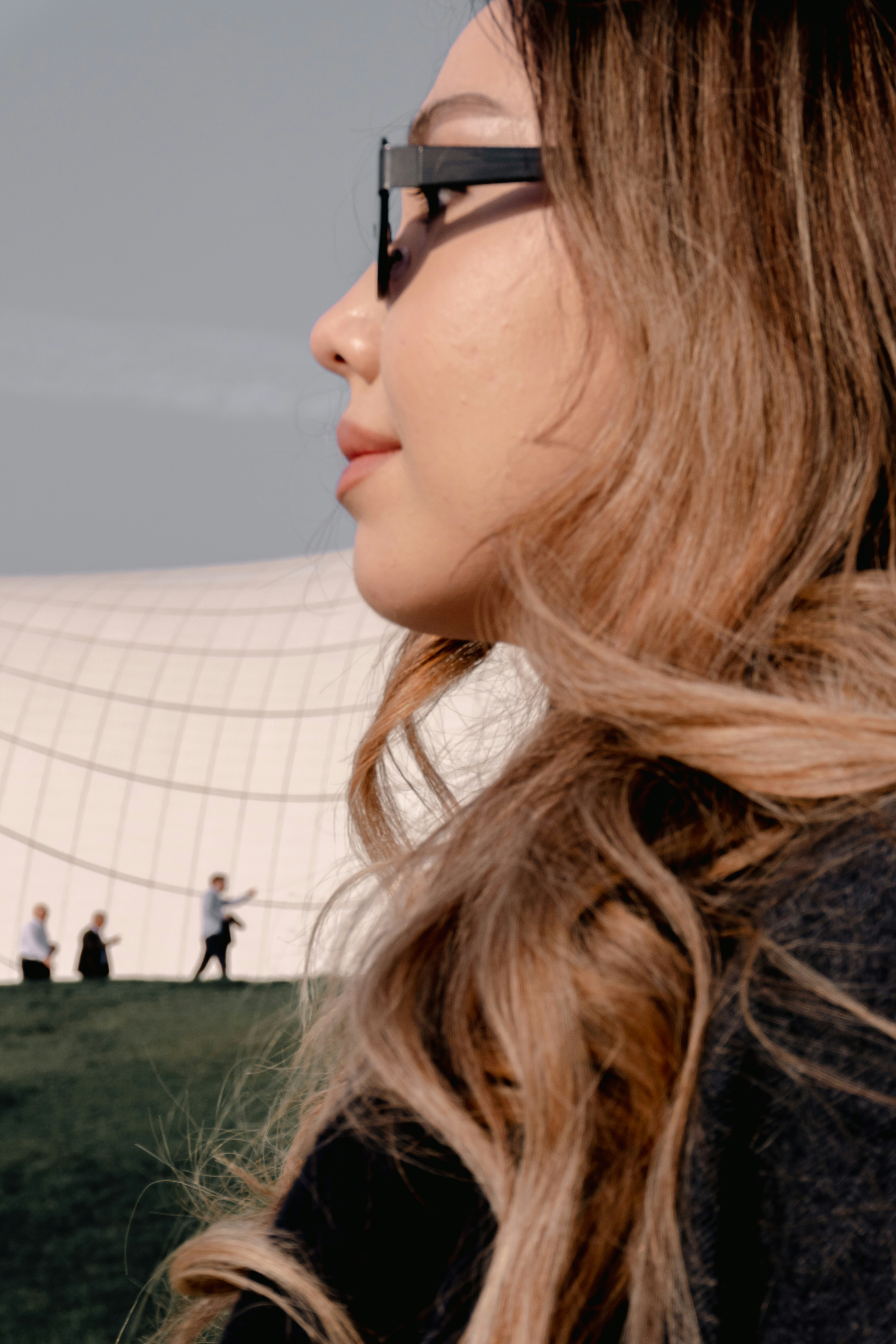 Sunlit Profile: A Quiet Fashion Moment with Sunglasses