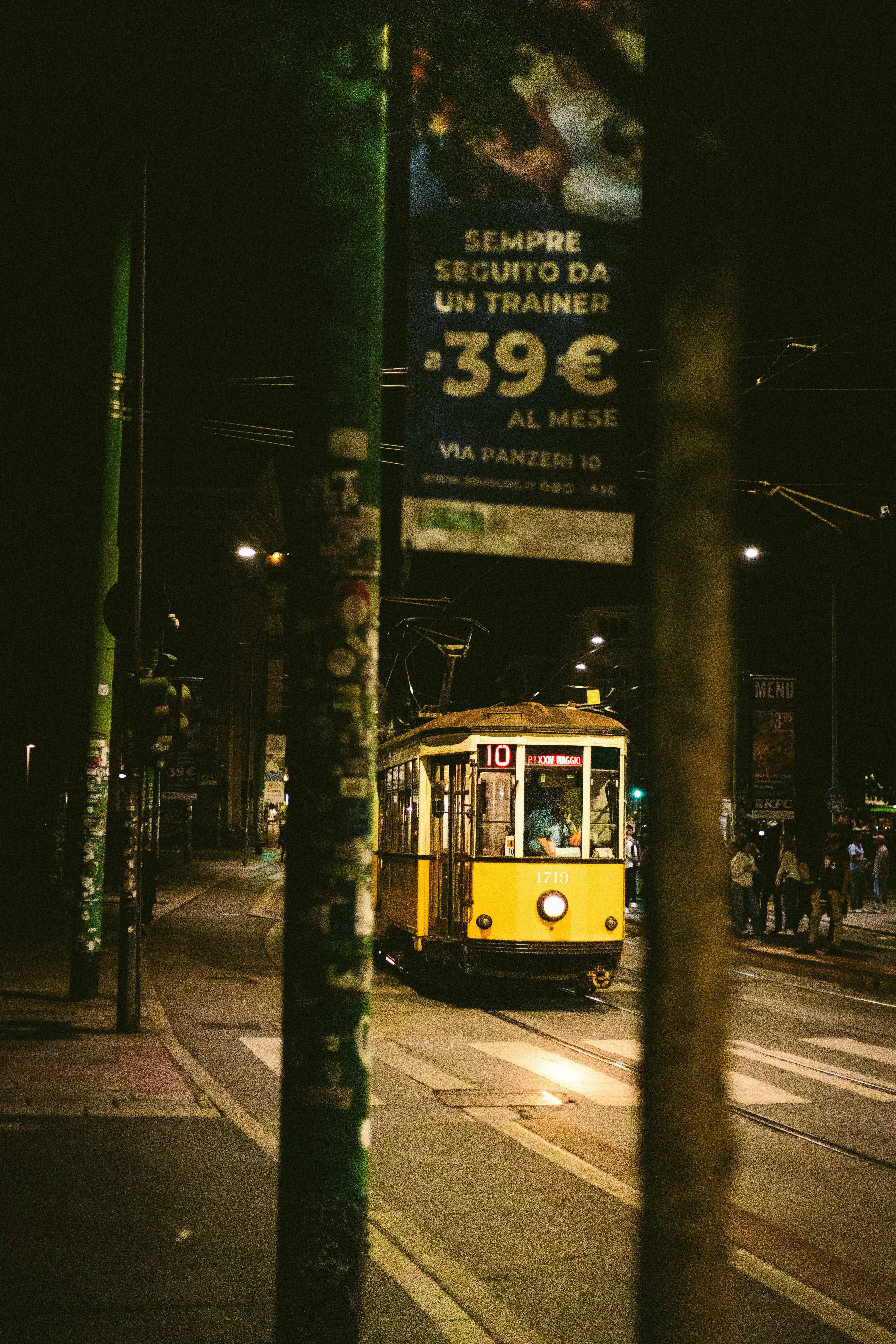 Night-Glow Tram: A Yellow Carriage Piercing the Quiet City