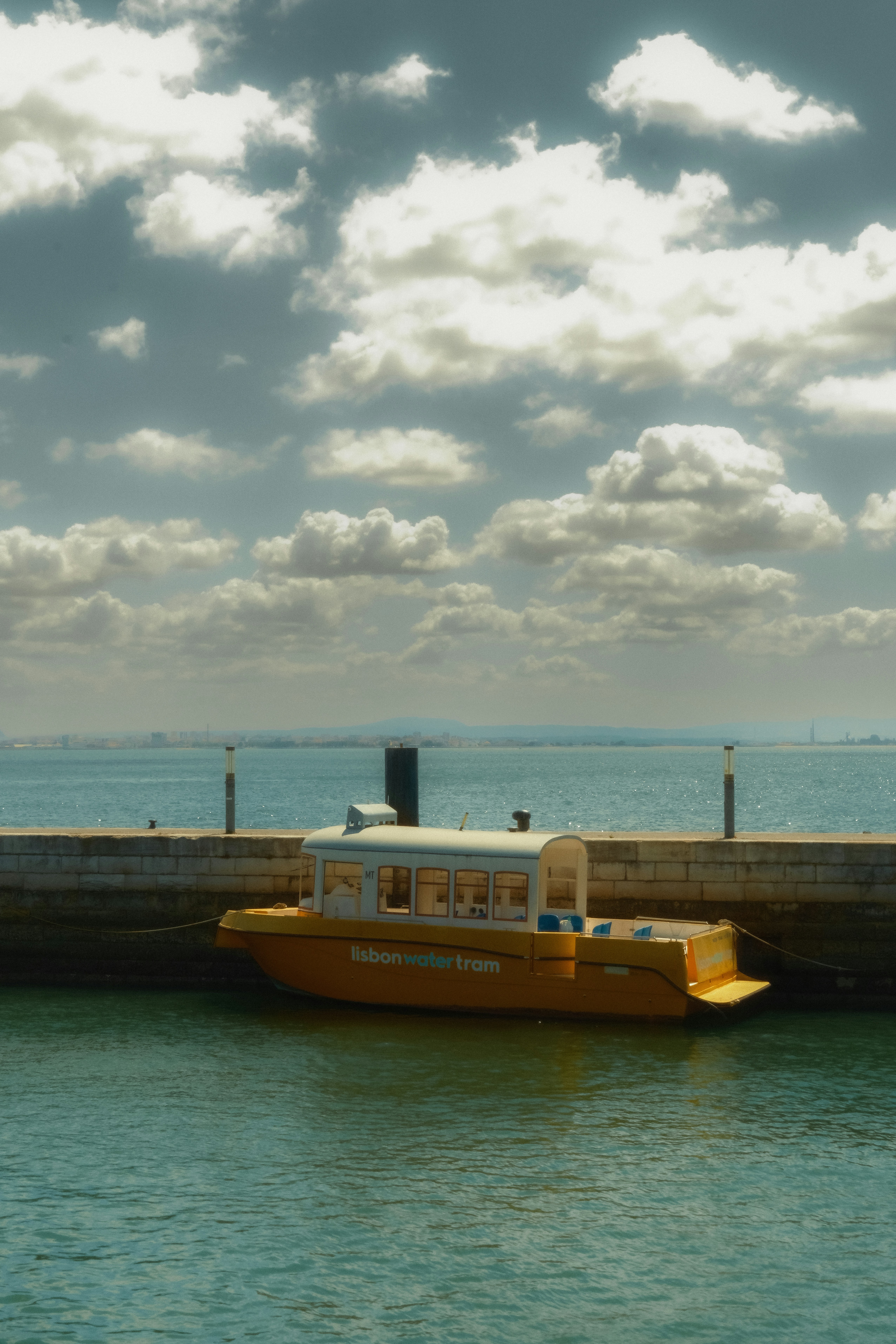 Harbor Serenity: The Lisbon Water Tram at Rest