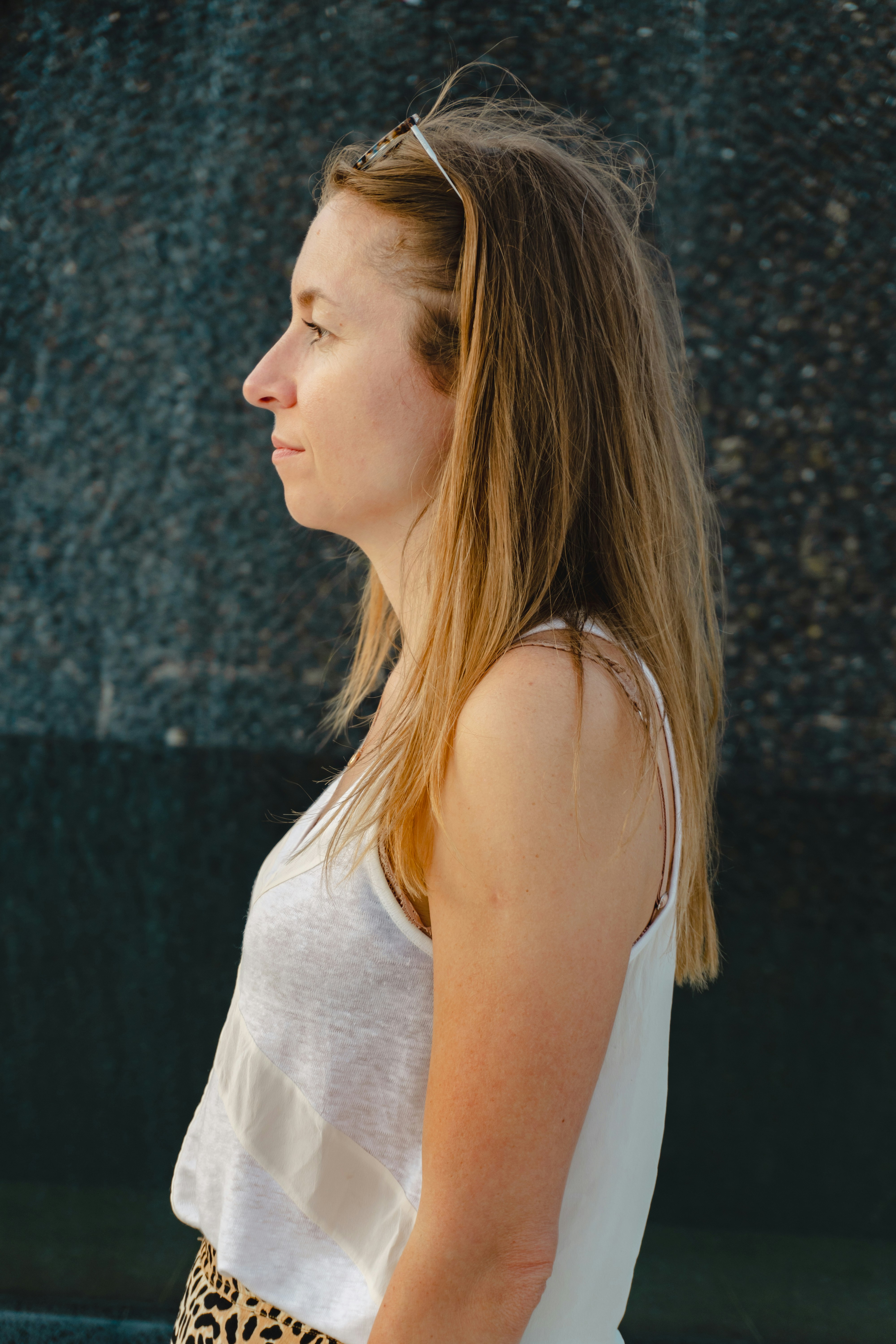 Woman in white tank top with sunglasses on head photo – Free Portrait ...