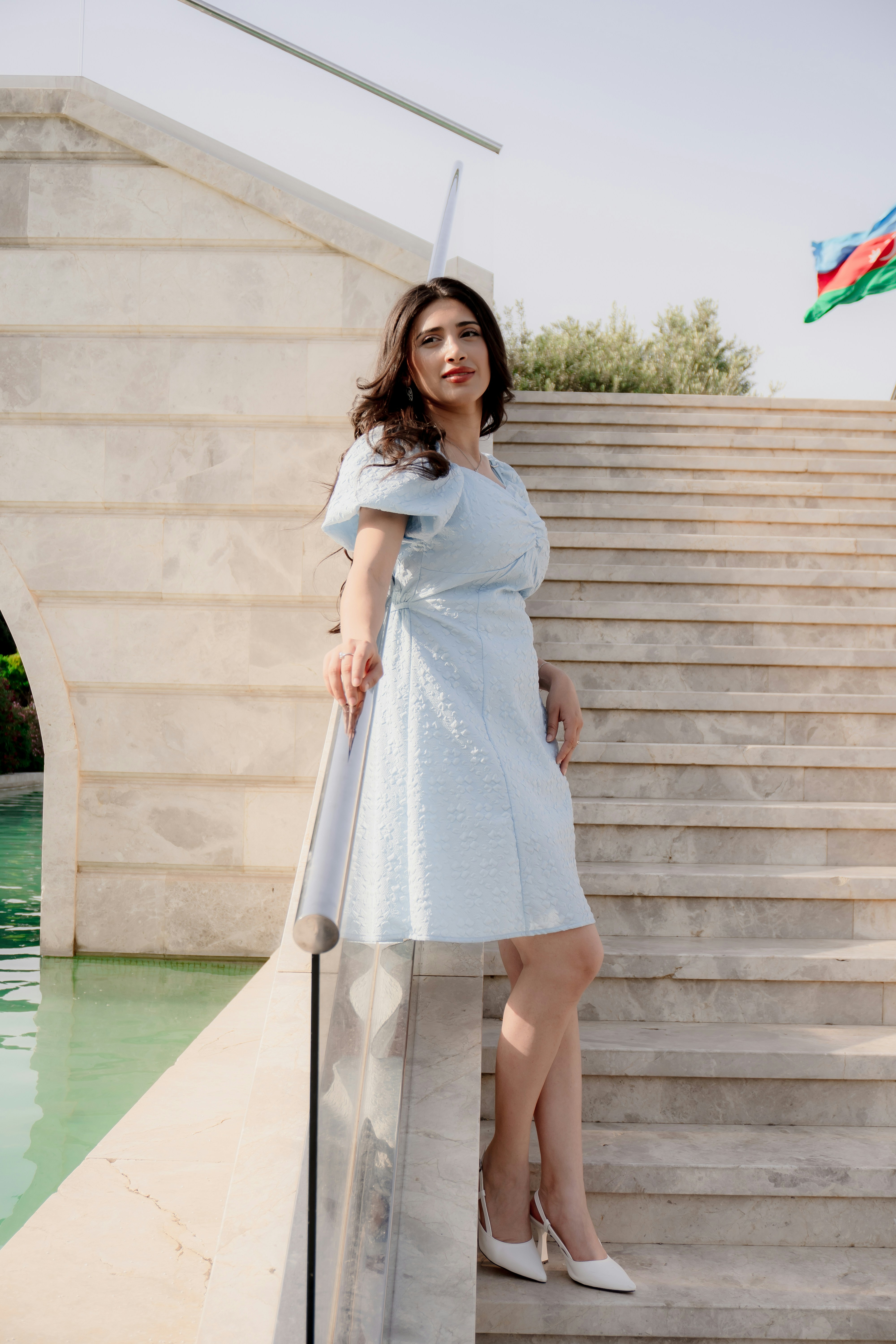 Portrait on Marble Steps: Quiet Grace by the Canal