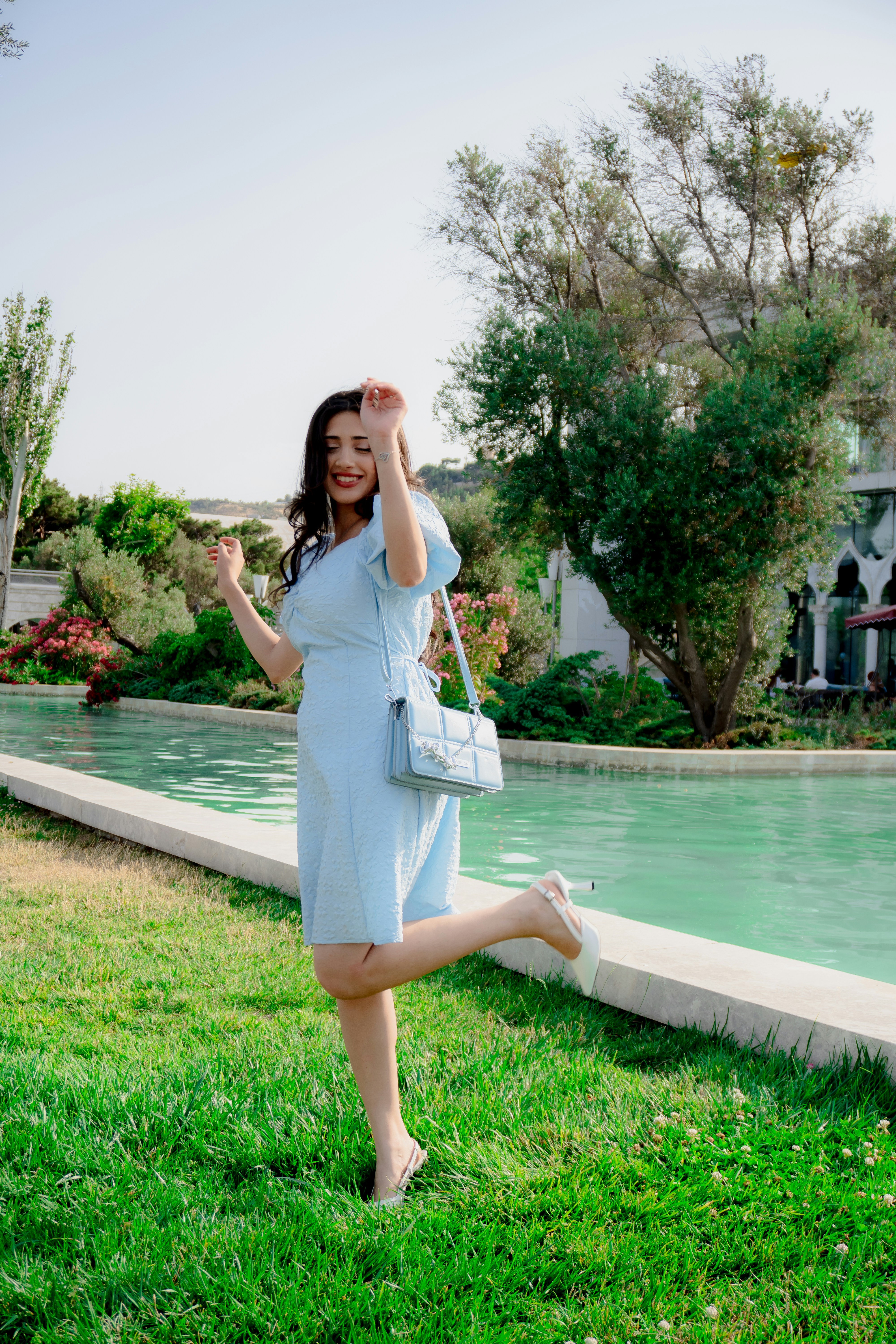 Pastel Poise by the Pool: A Garden Portrait in Soft Light