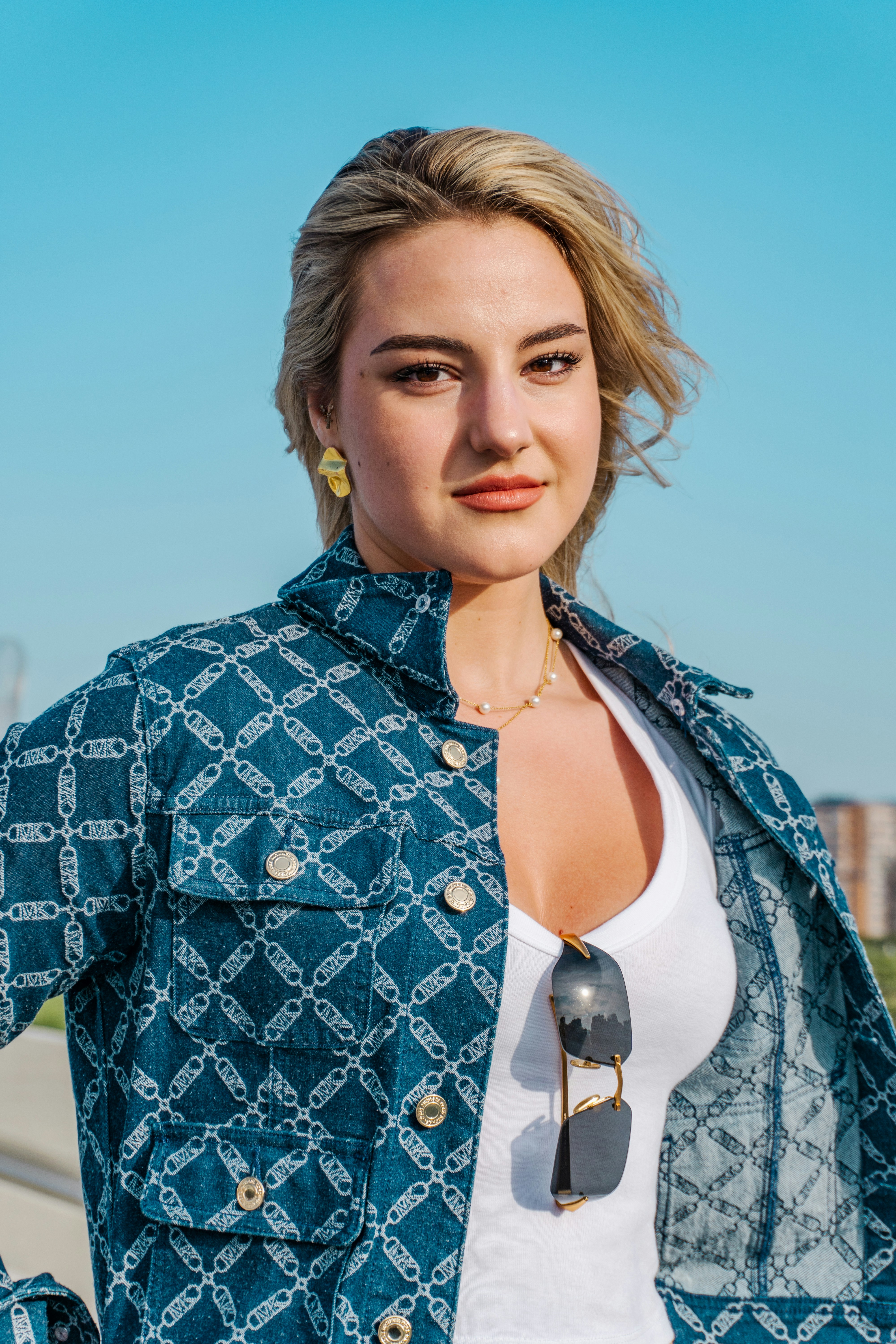 Sunlit Confidence: A City-Edge Portrait