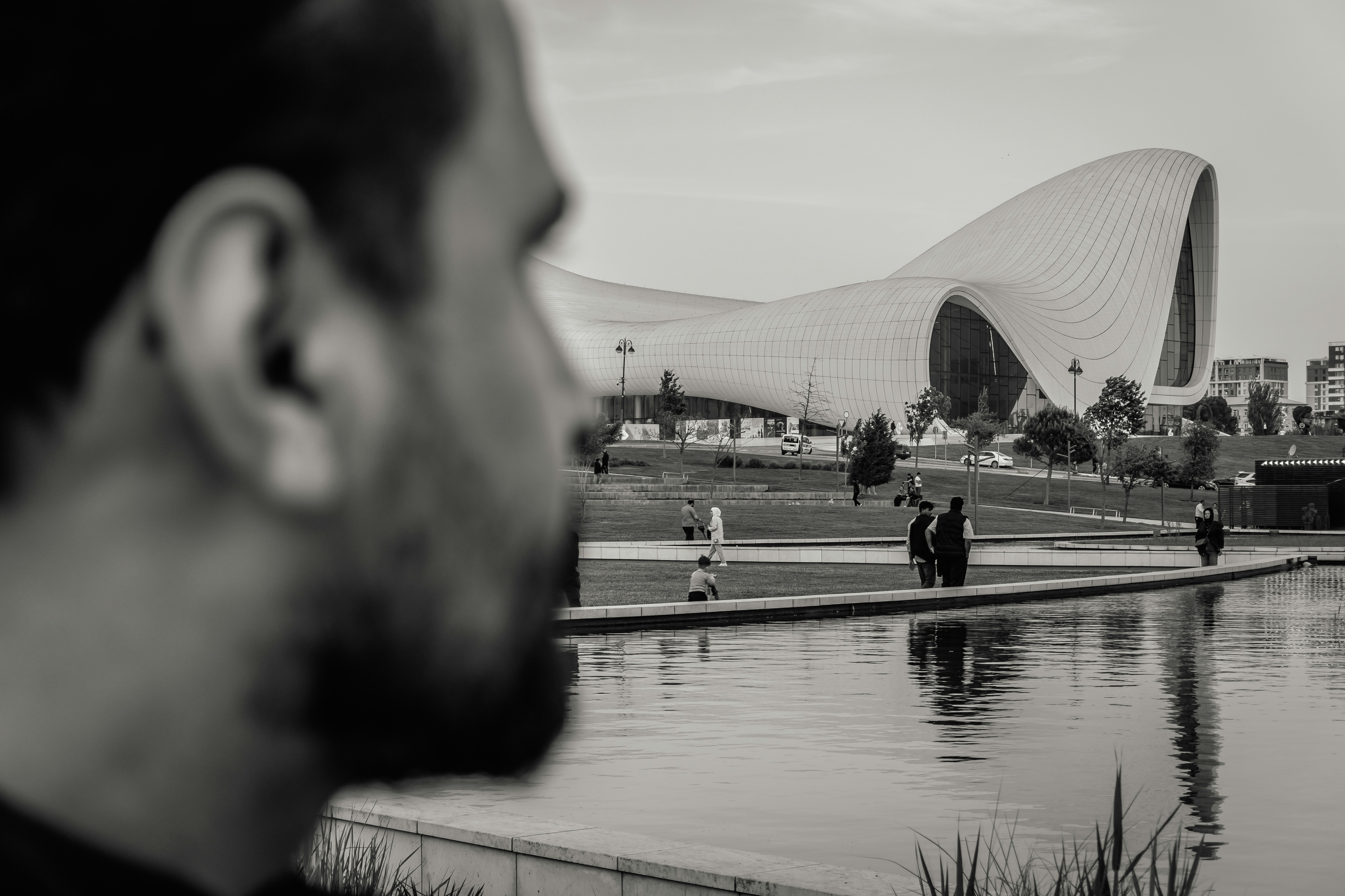 Shadowed Perspective by the Curved Riverside Pavilion