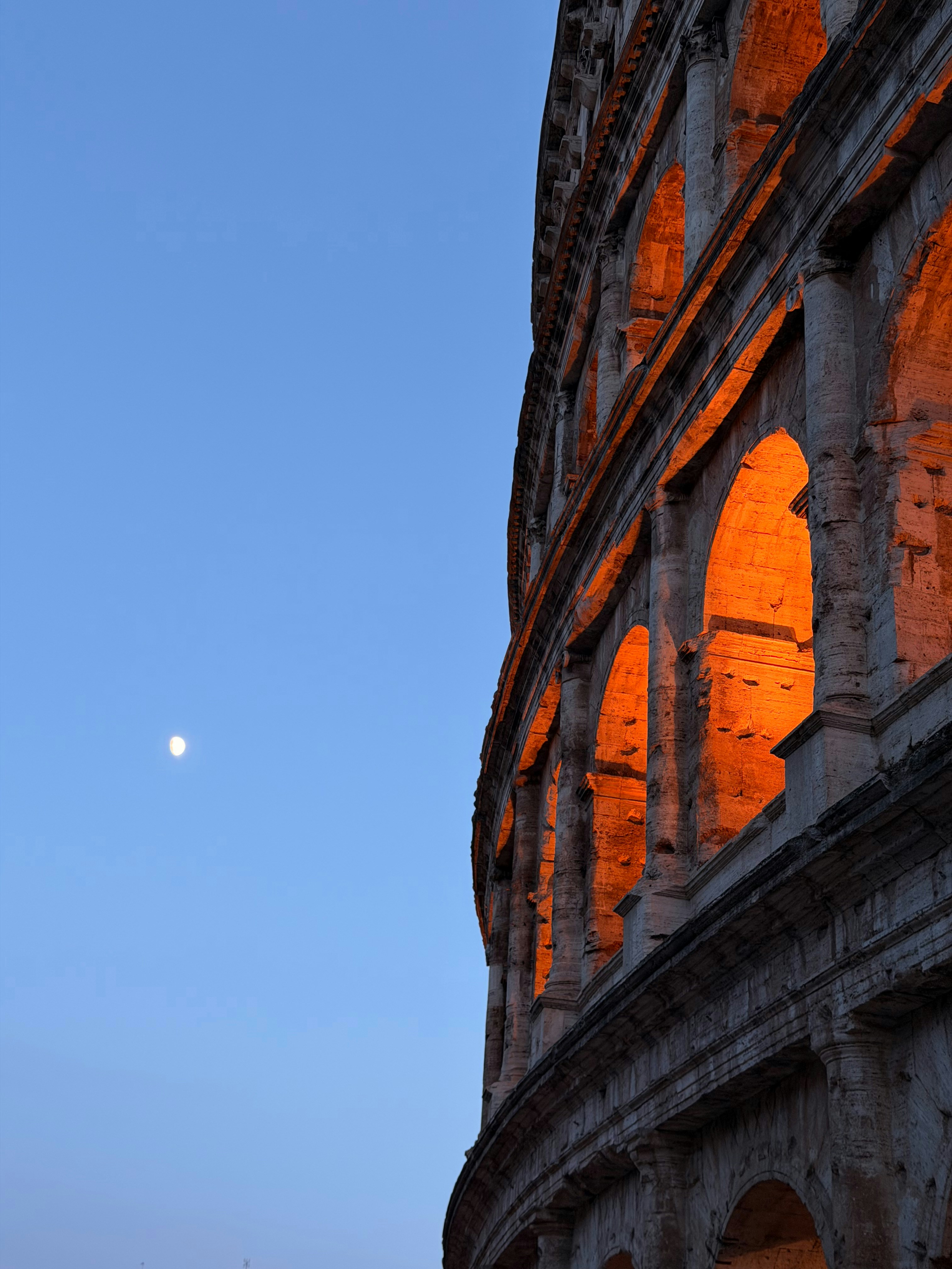 Ember Arches by Moonlight: The Colosseum in Twilight