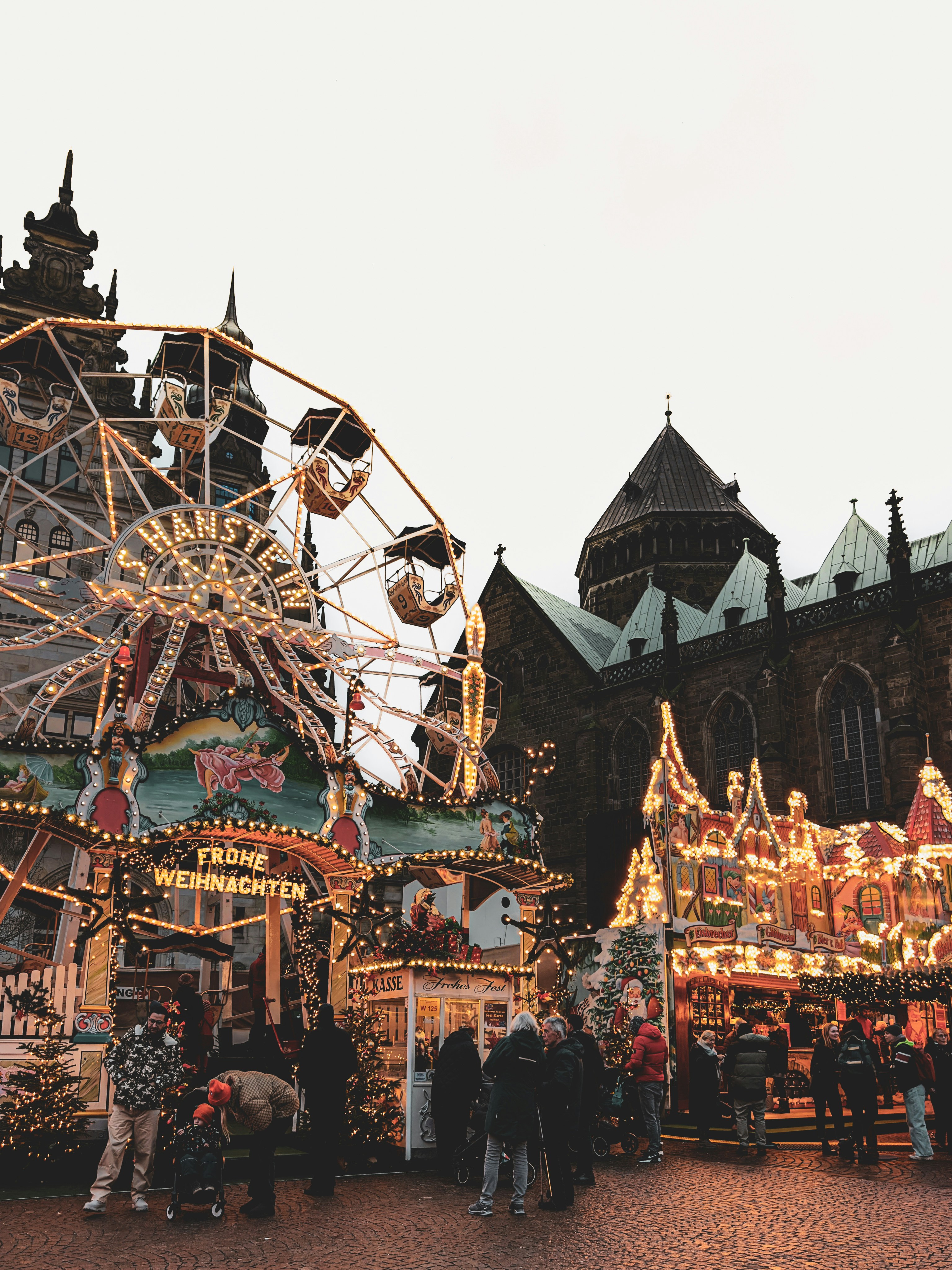 Market of Lights: Ferris Wheel Spins Over a Vintage Christmas Square