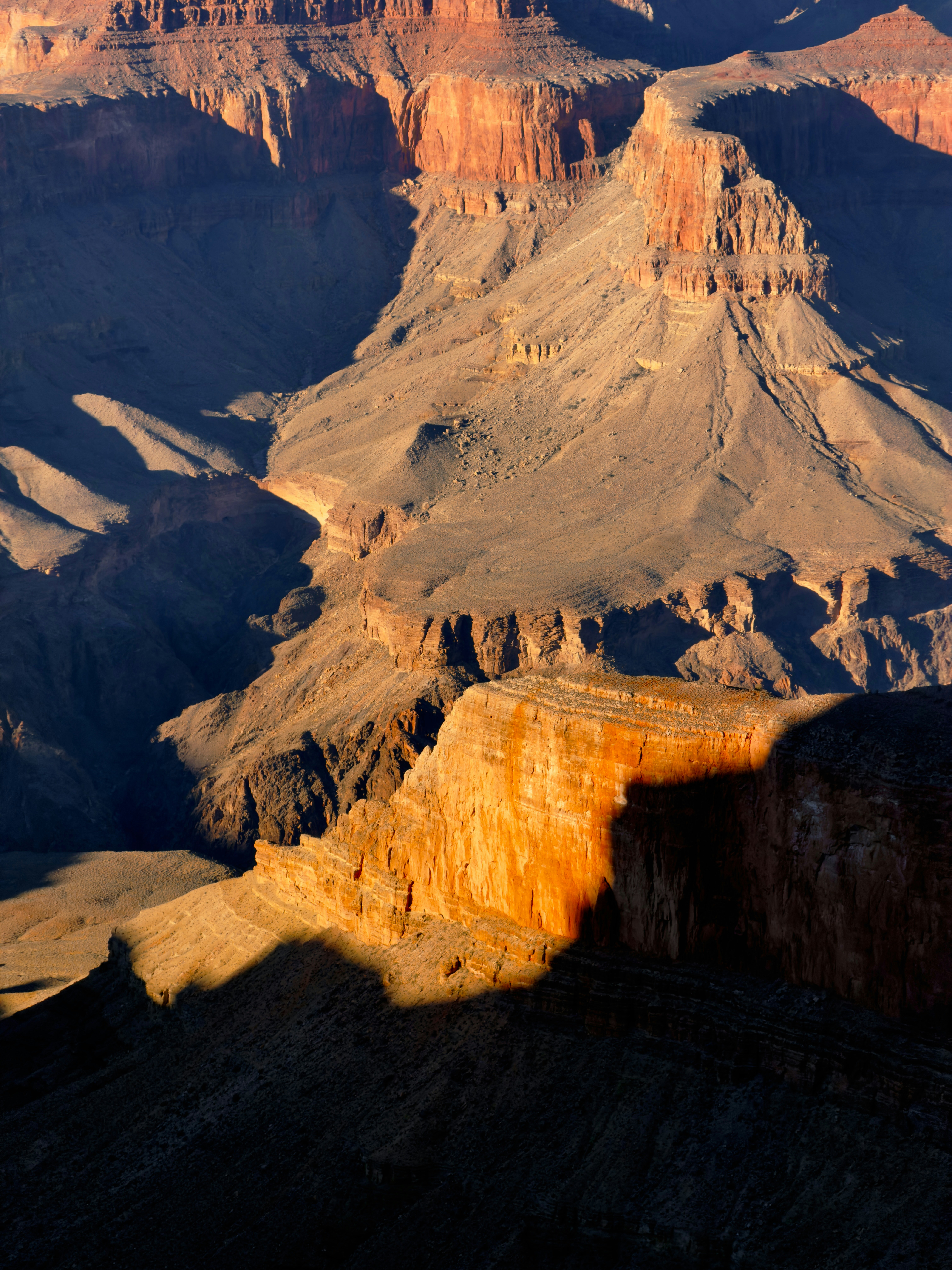 Crimson Cliffs at Golden Hour: Grand Canyon's Layered Edge