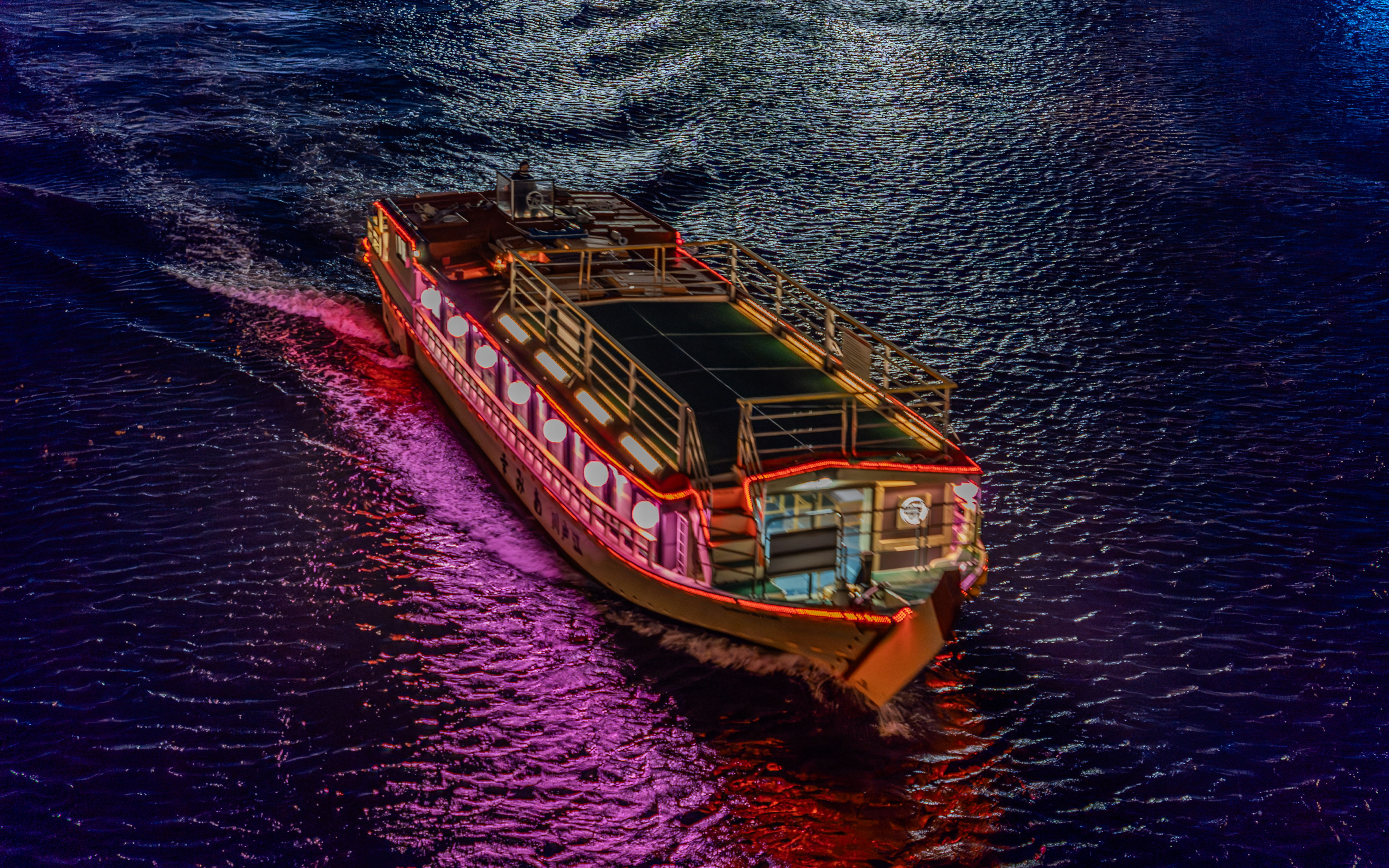 Neon-Lit Riverboat: A Midnight Passage