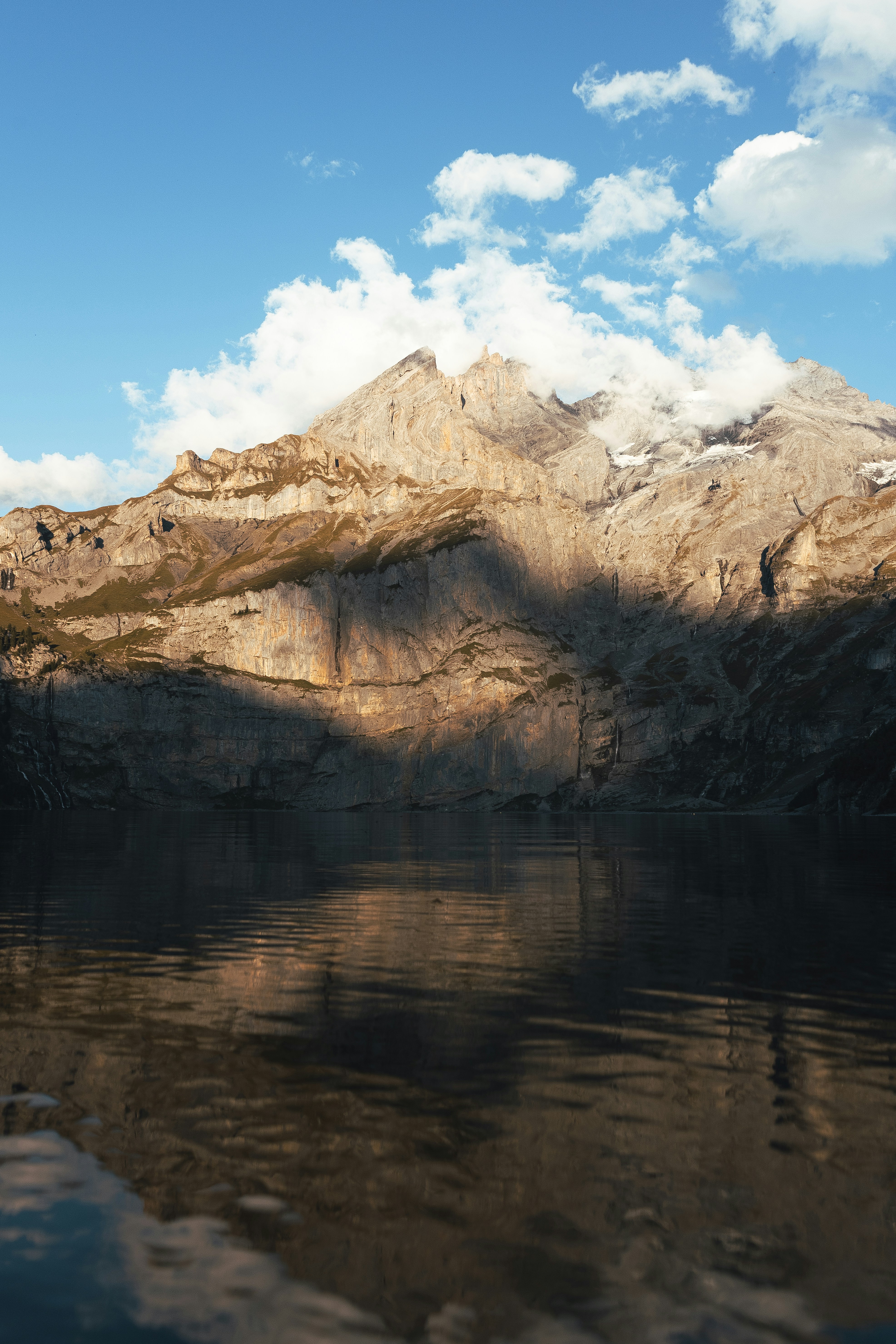 Ridge of Light Over a Calm Alpine Mirror
