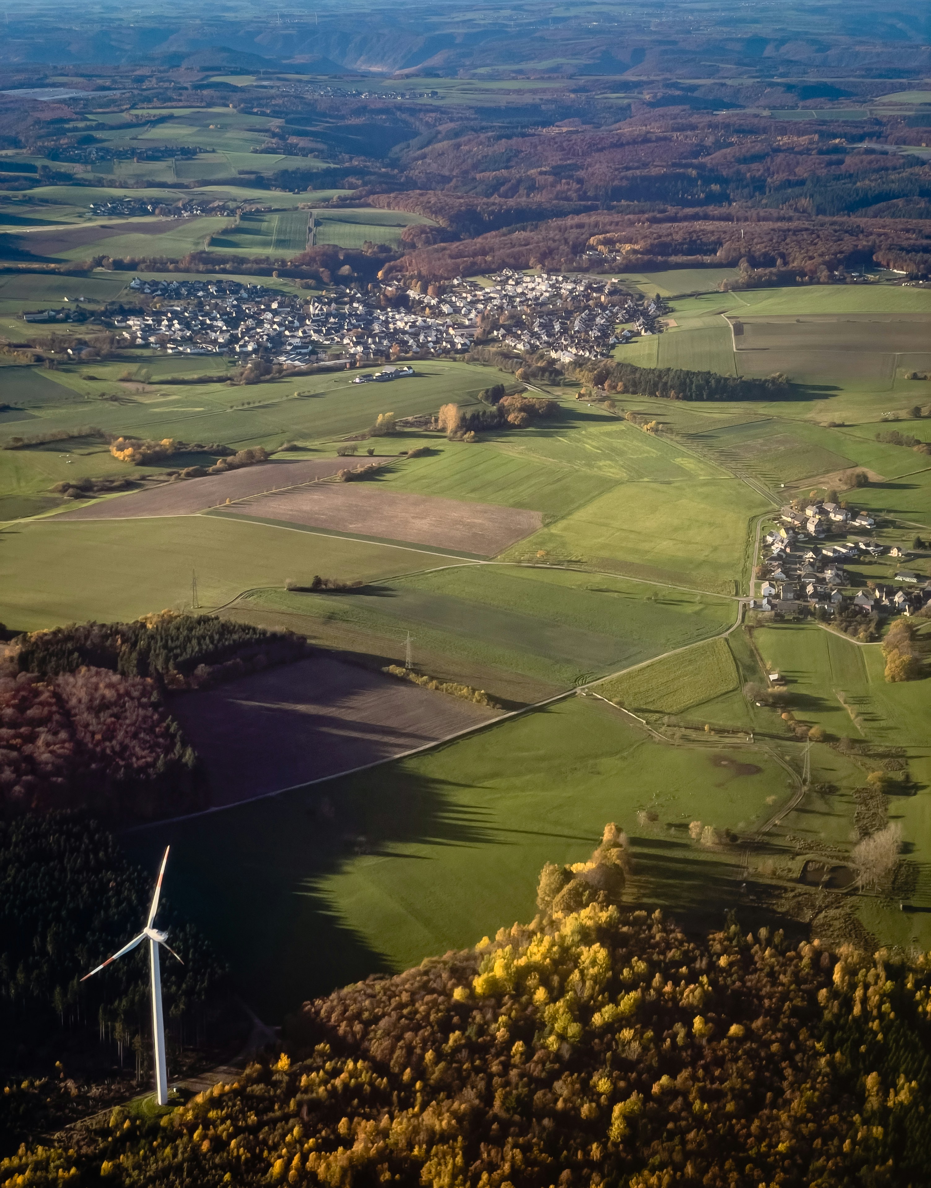 Patchwork Valleys and a Lone Windmill: An Aerial Portrait