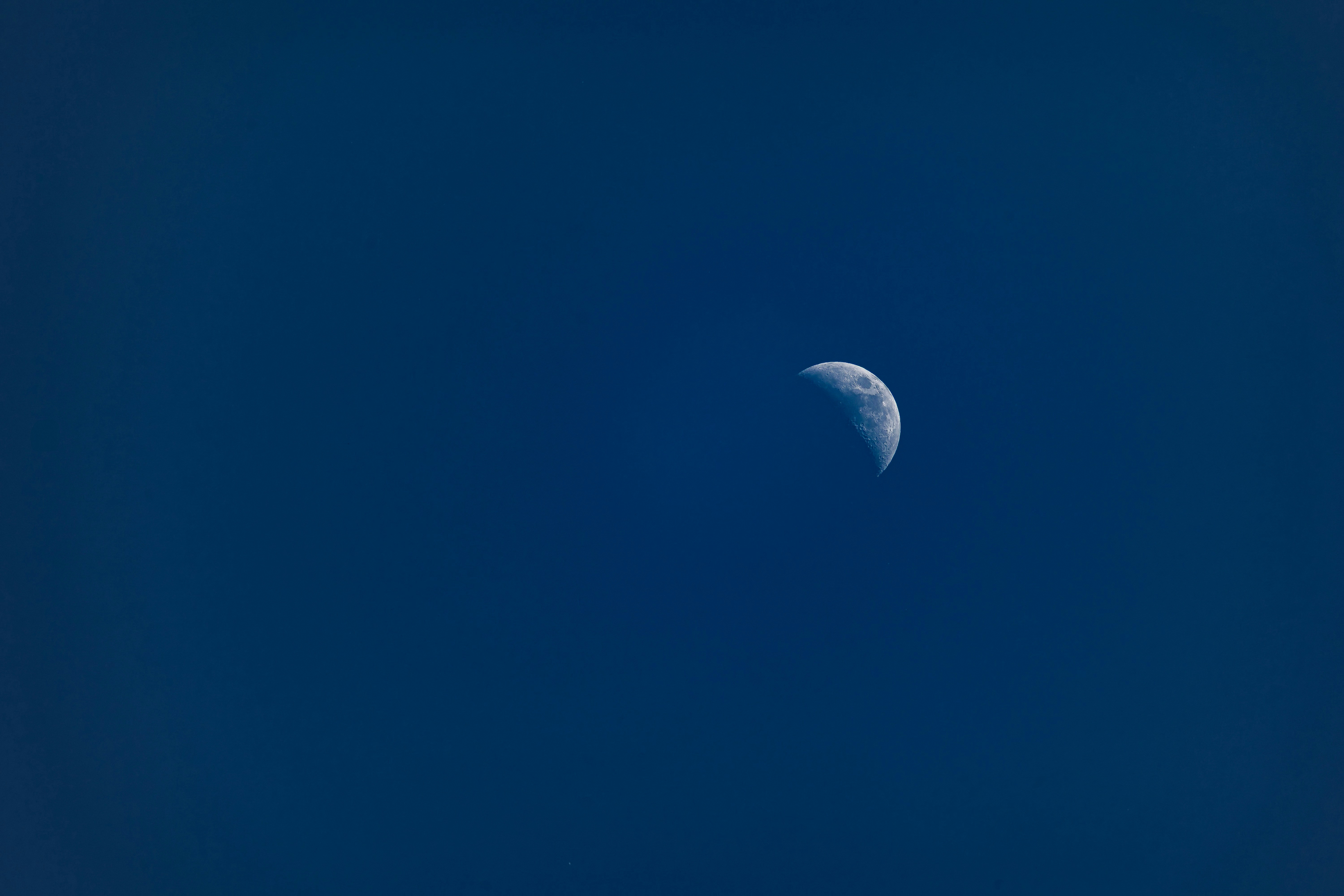 Crescent in Velvet Indigo: A Quiet Moon in a Minimal Sky