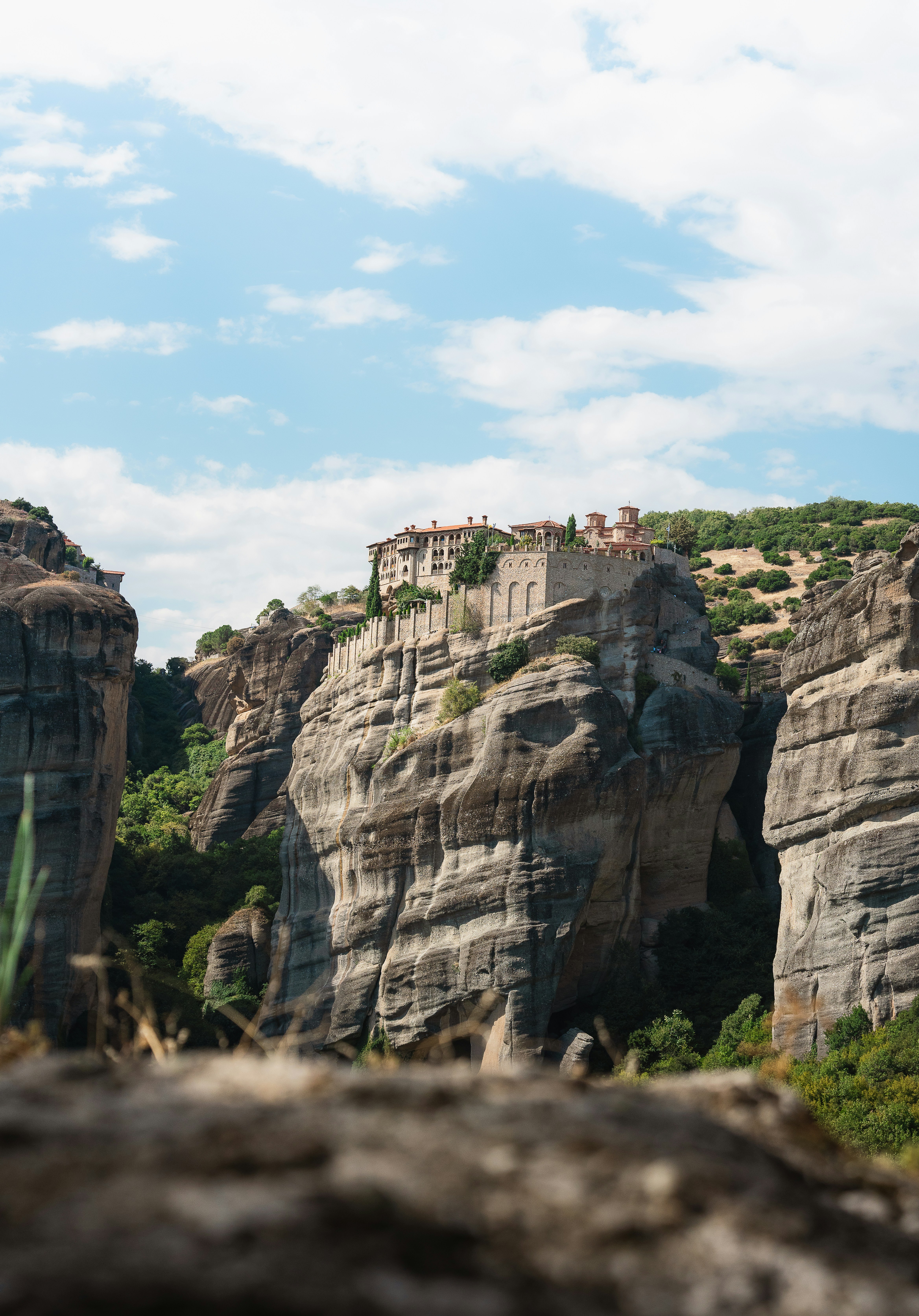 Clifftop Monastery Crowned by Carved Stone Spires