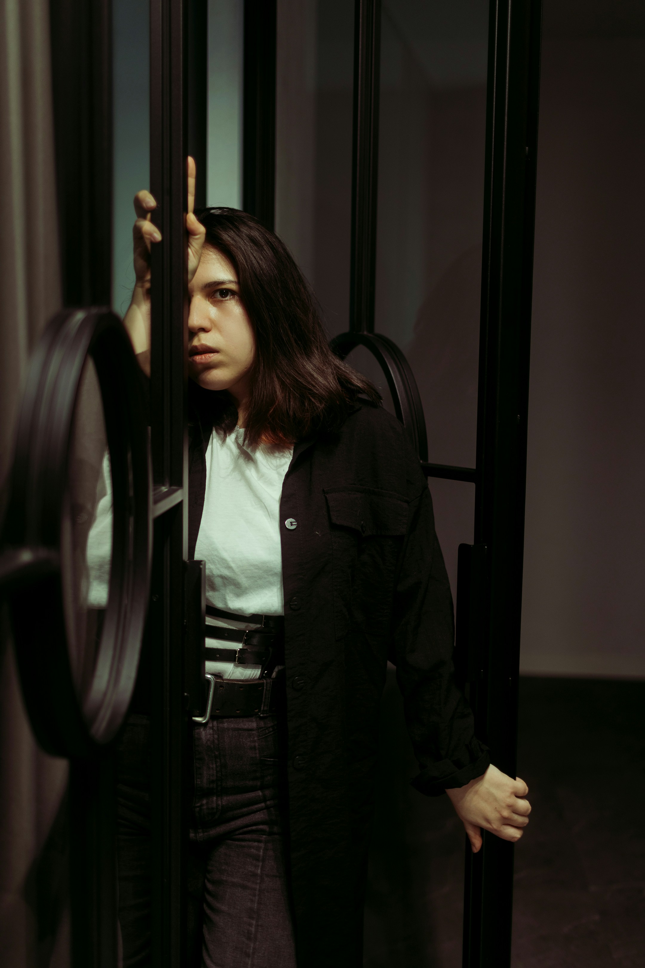 Between Rails and Quiet Light: Portrait in a Narrow Corridor