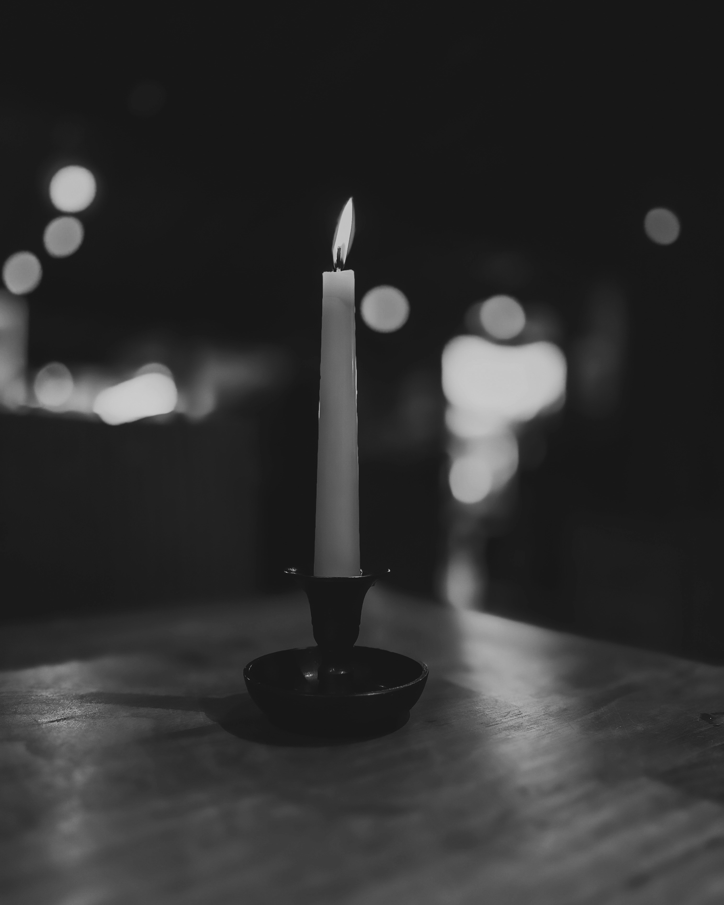 Midnight Glow: One Candle on a Silent Table