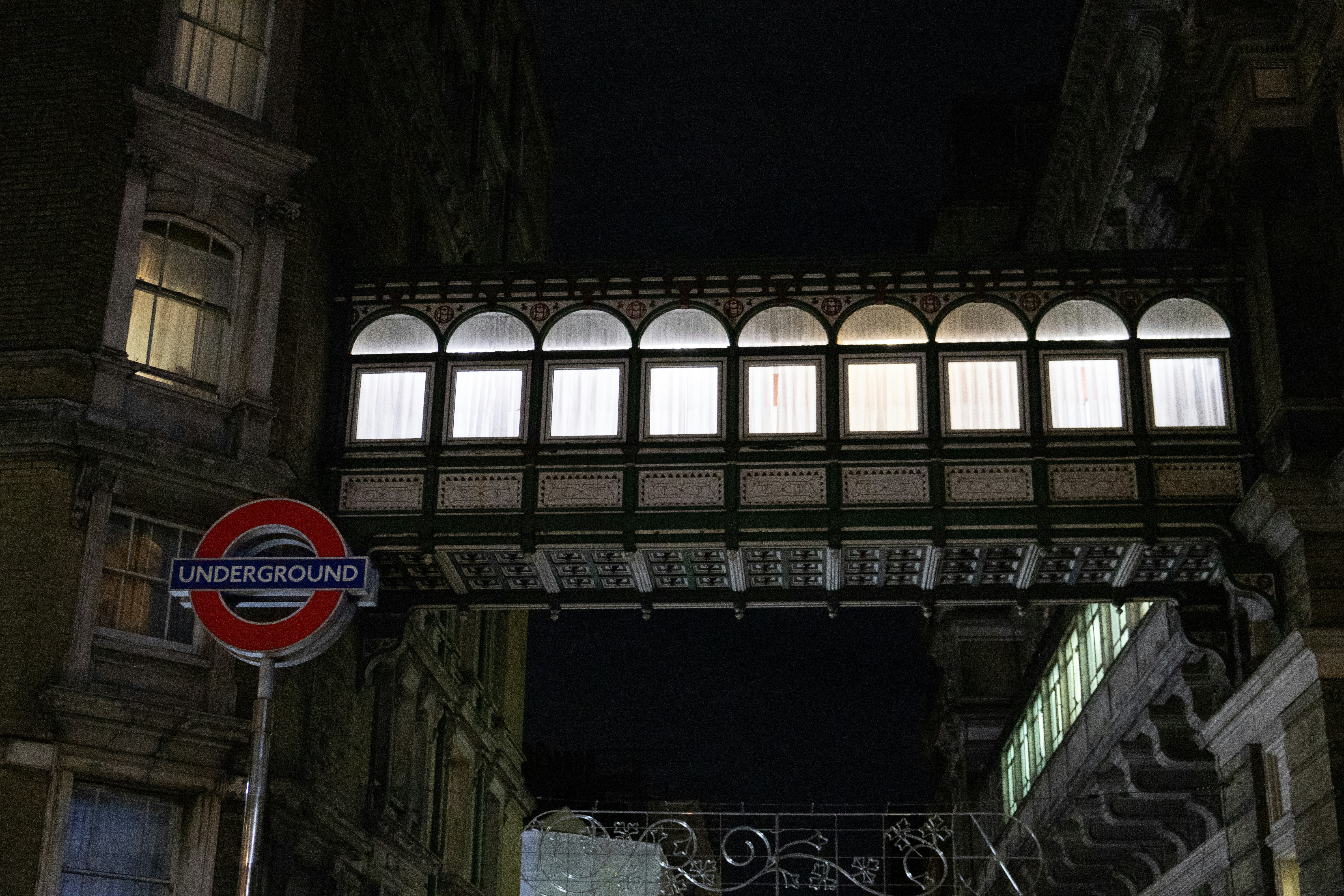 Glass-Arcade Night Over a London Street