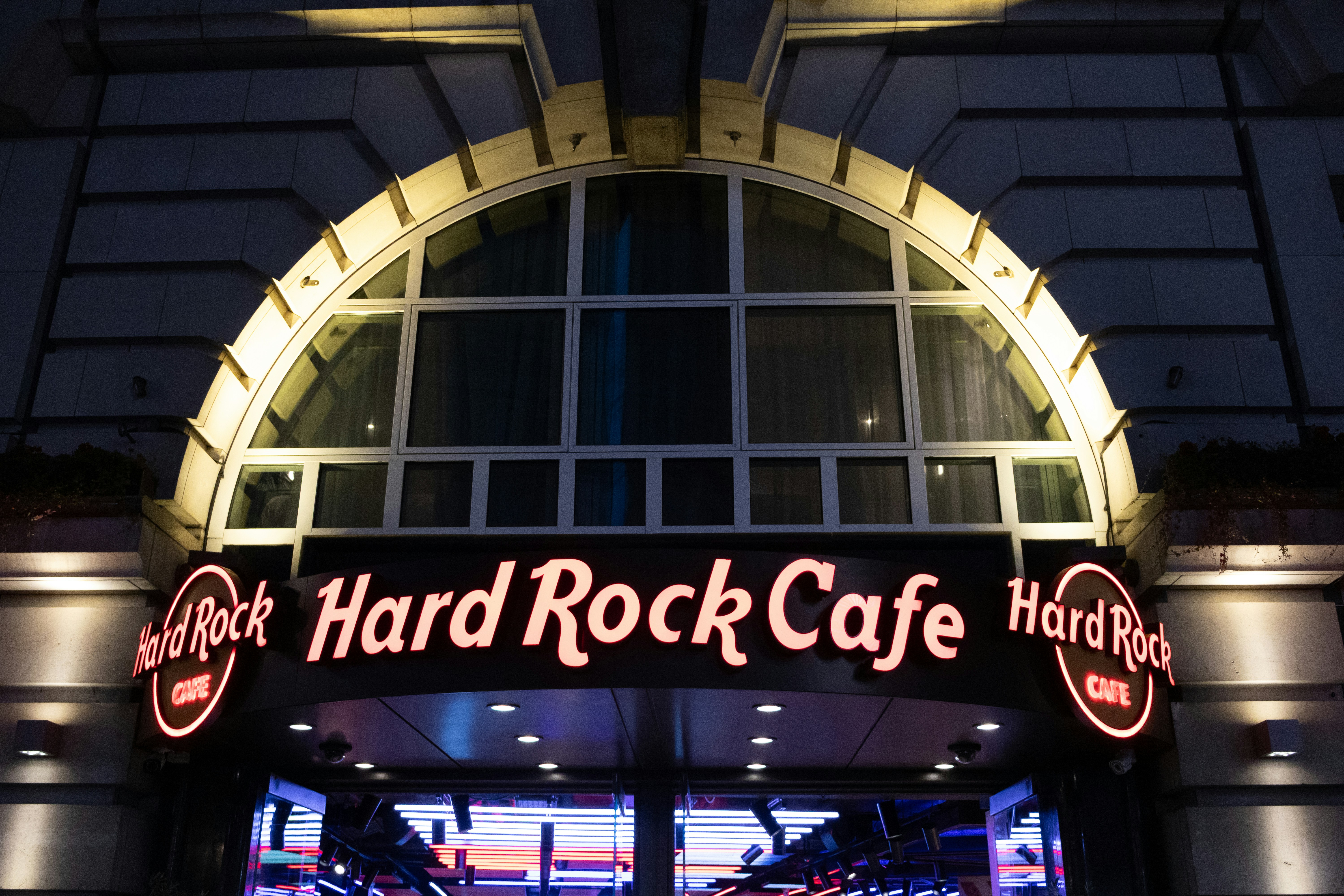 Neon Archway Over the Nighttime Hard Rock Café Entrance