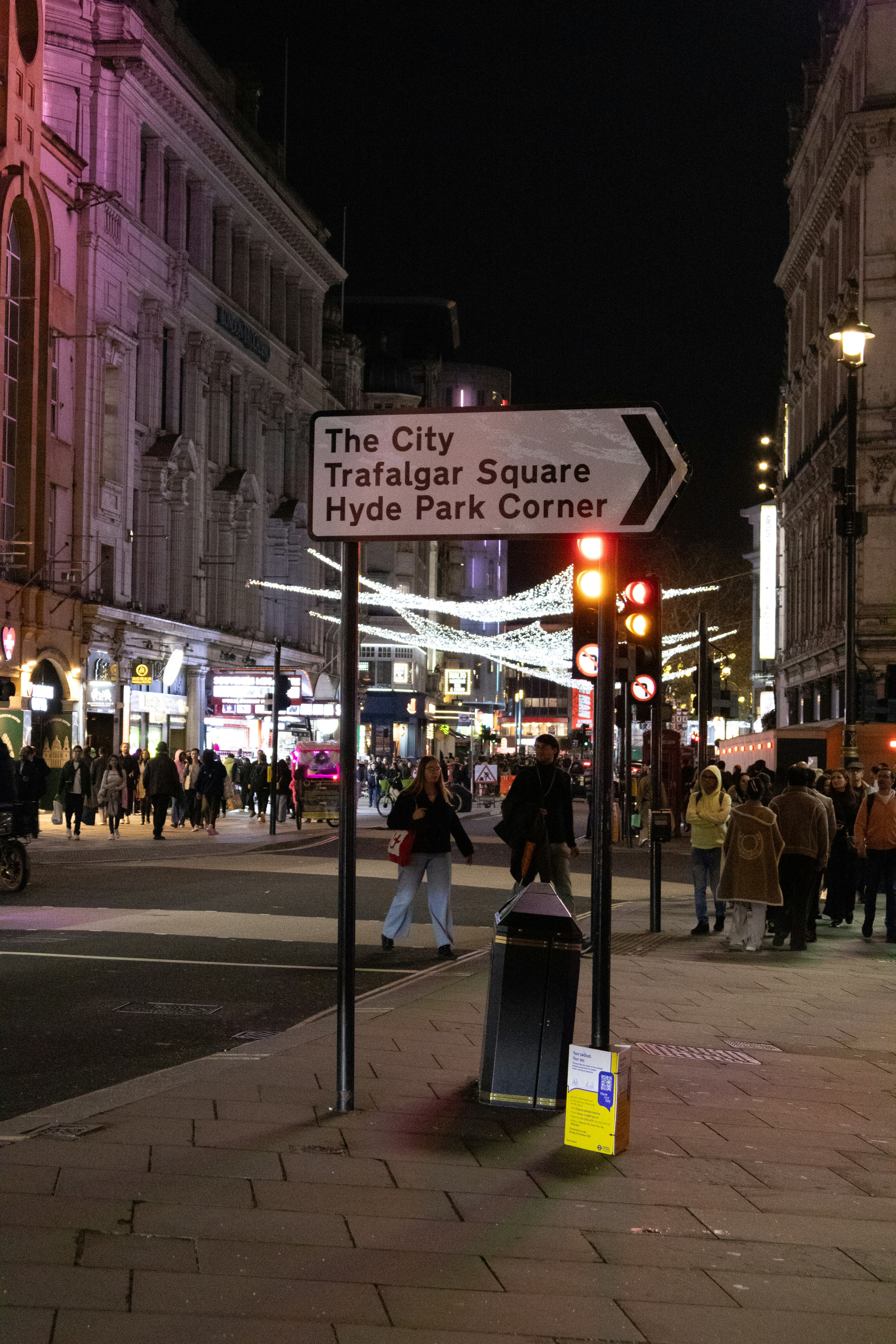 Night Signpost to Trafalgar Square: A Luminous London Street