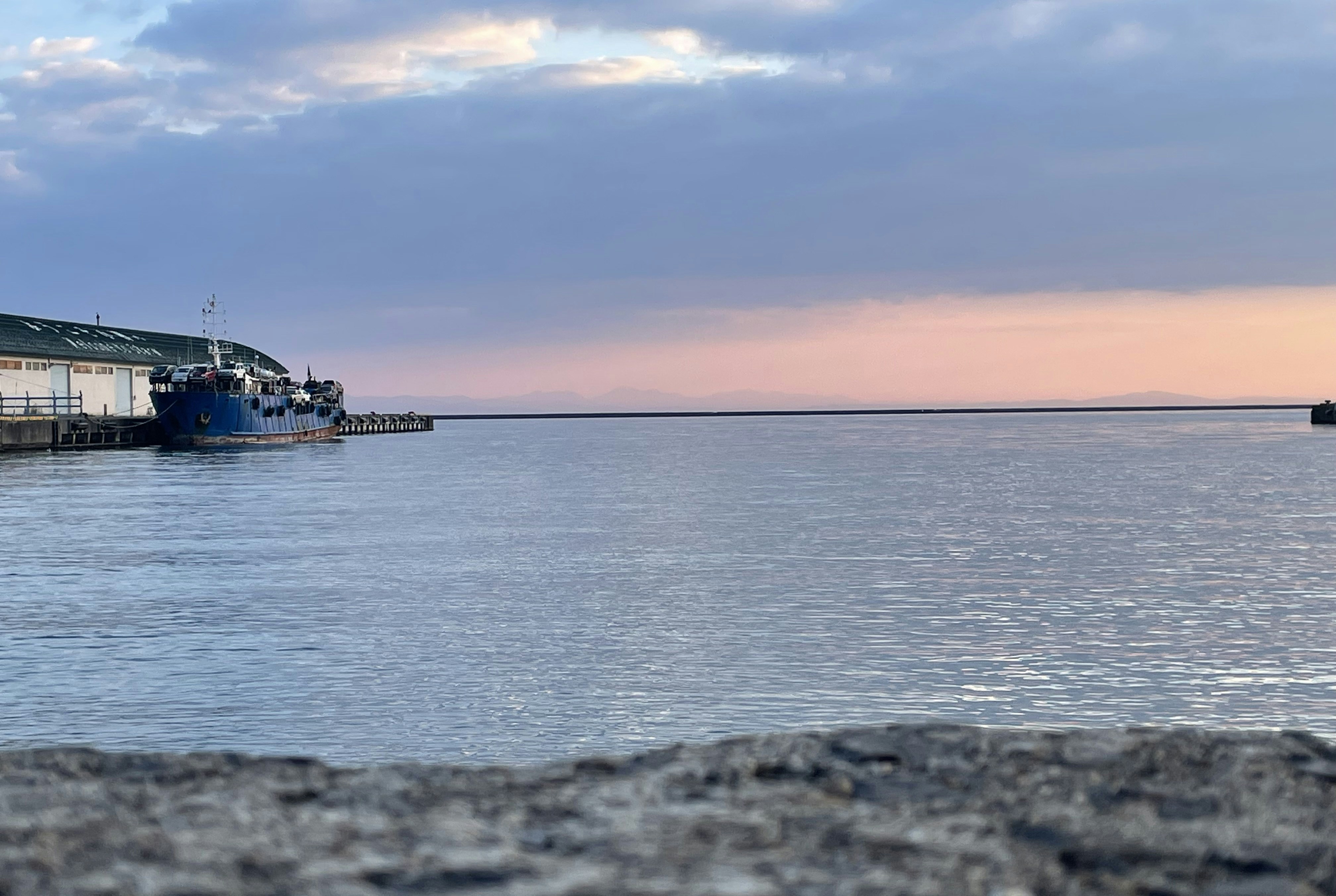 Dusk at the Dock: Boats Quietly Framed by a Velvet Horizon