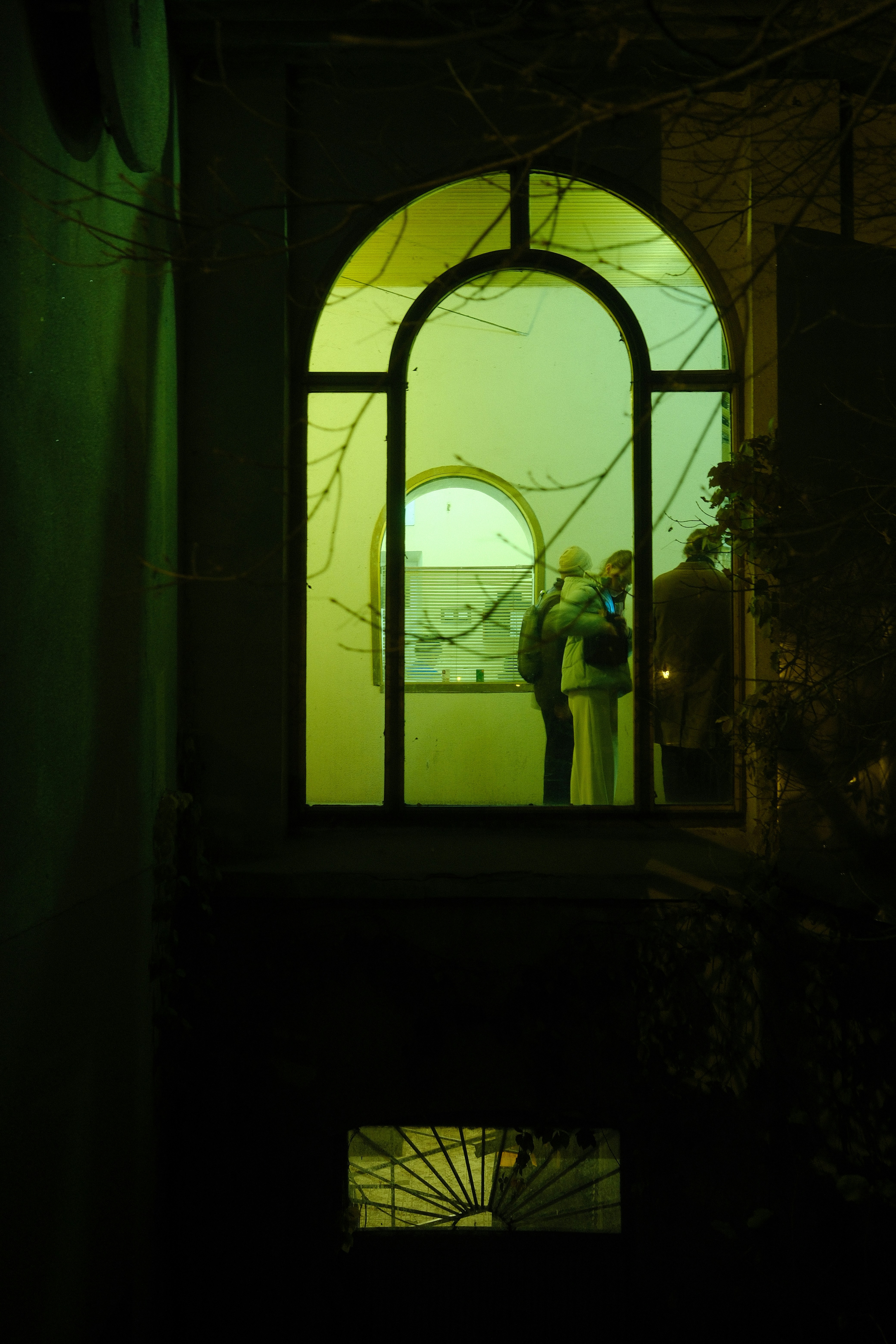 Green-lit Archway Reveal: Echoes of a Nighttime Conversation