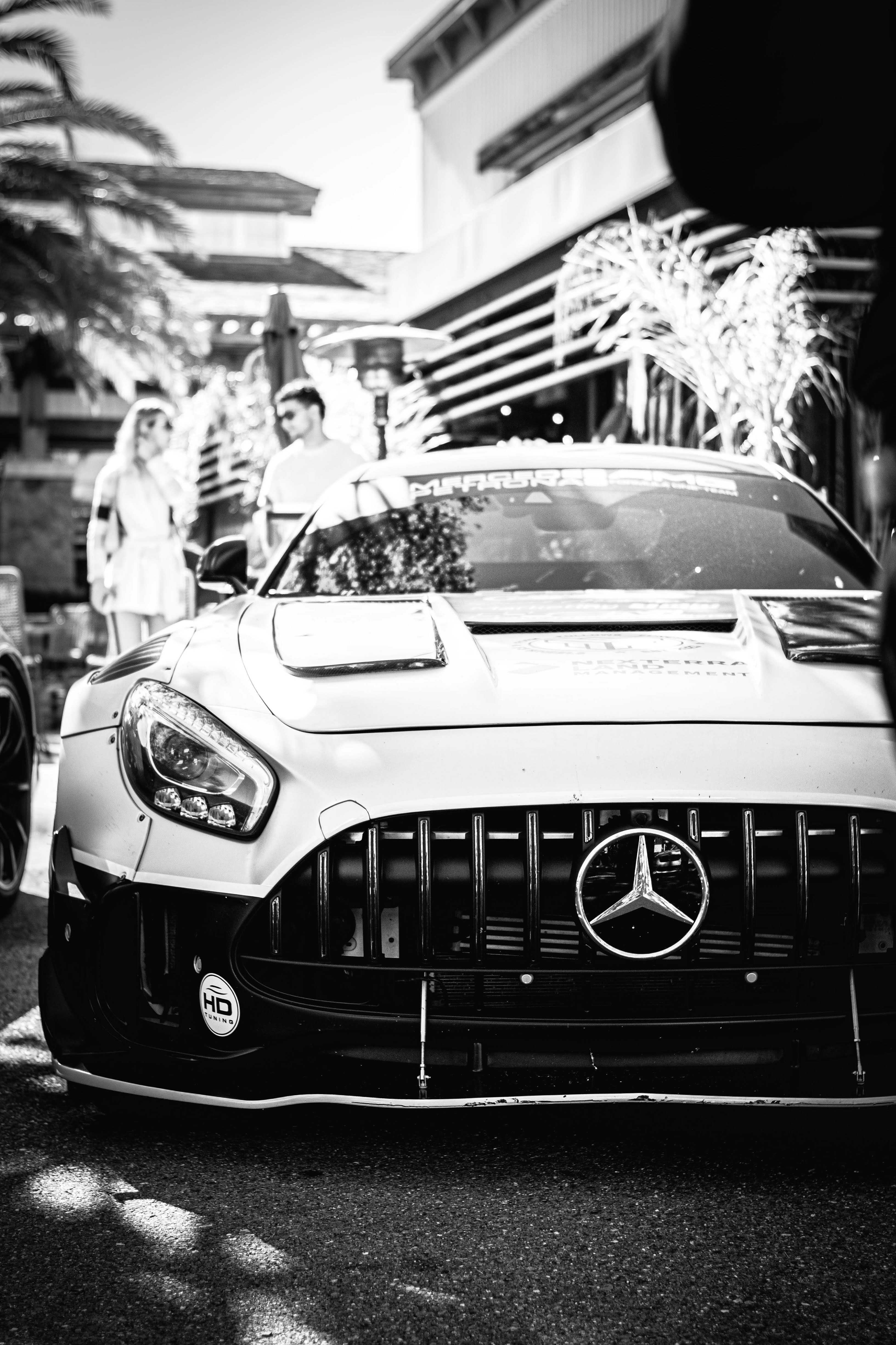 Monochrome Showfront: Mercedes-AMG GT at a sunlit street car meet