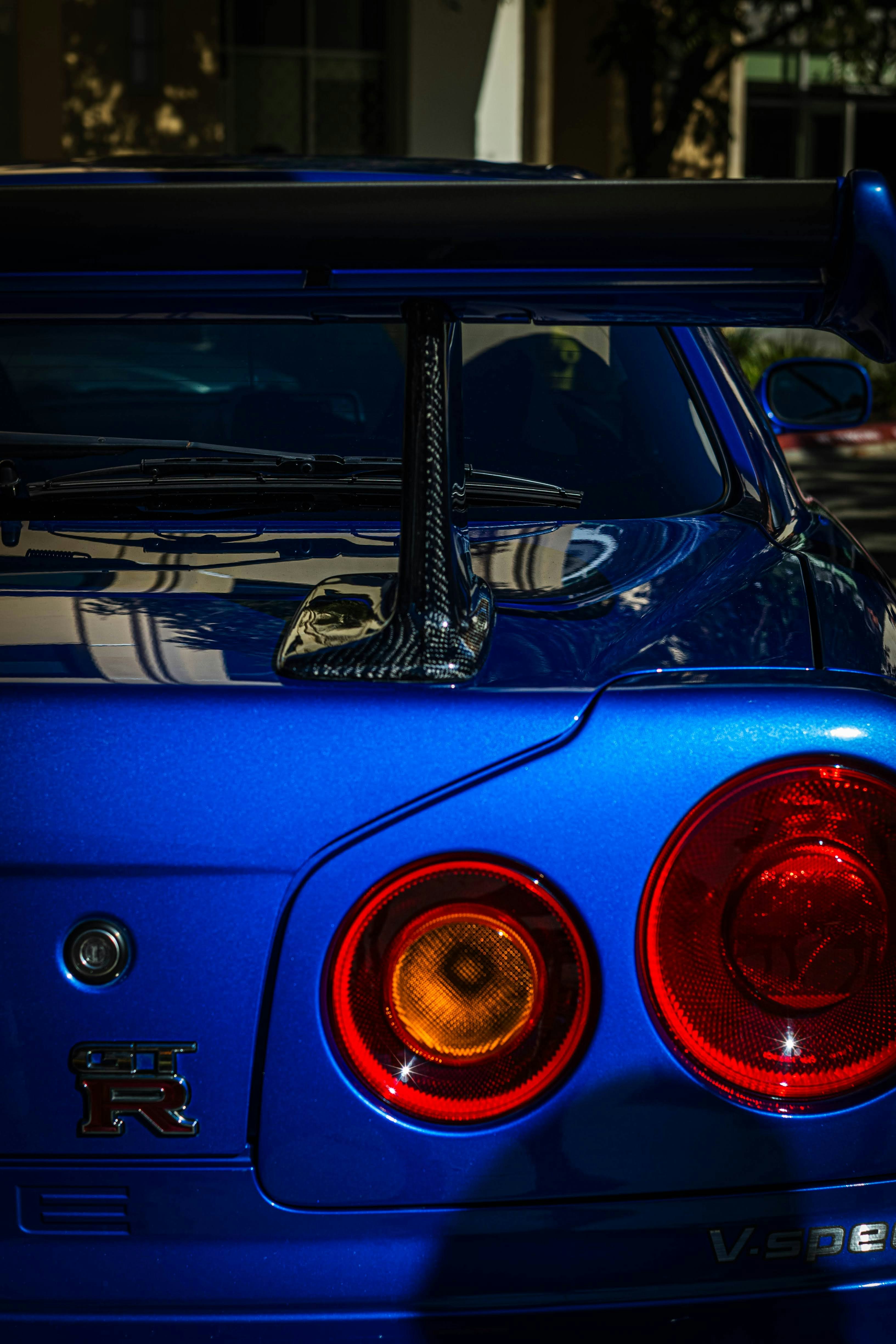 Blue GT-R Rear Detail: Carbon-Fiber Wing Pillar and Circular Taillights
