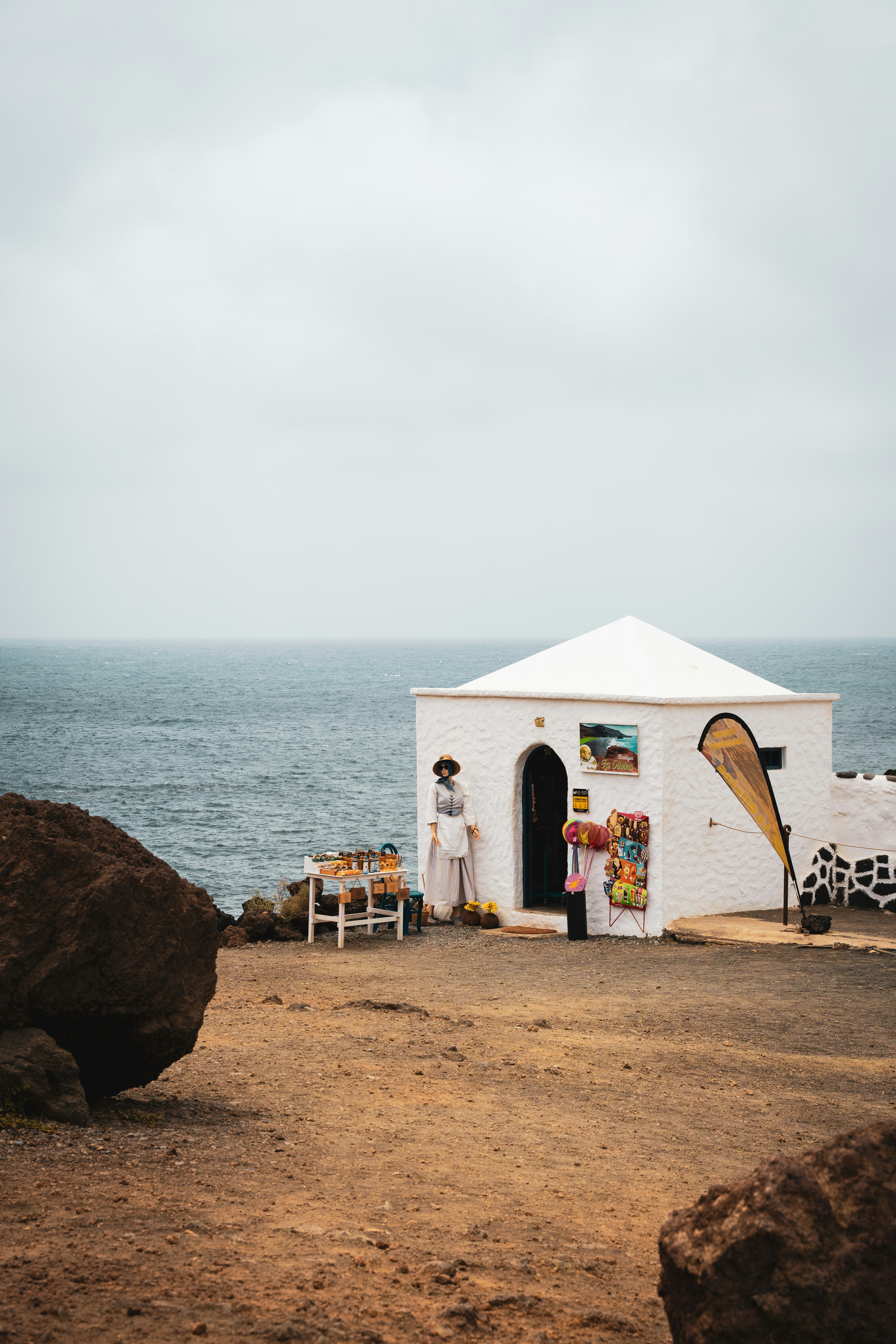 Seaside White Hut Vendors at the Cliffside Market