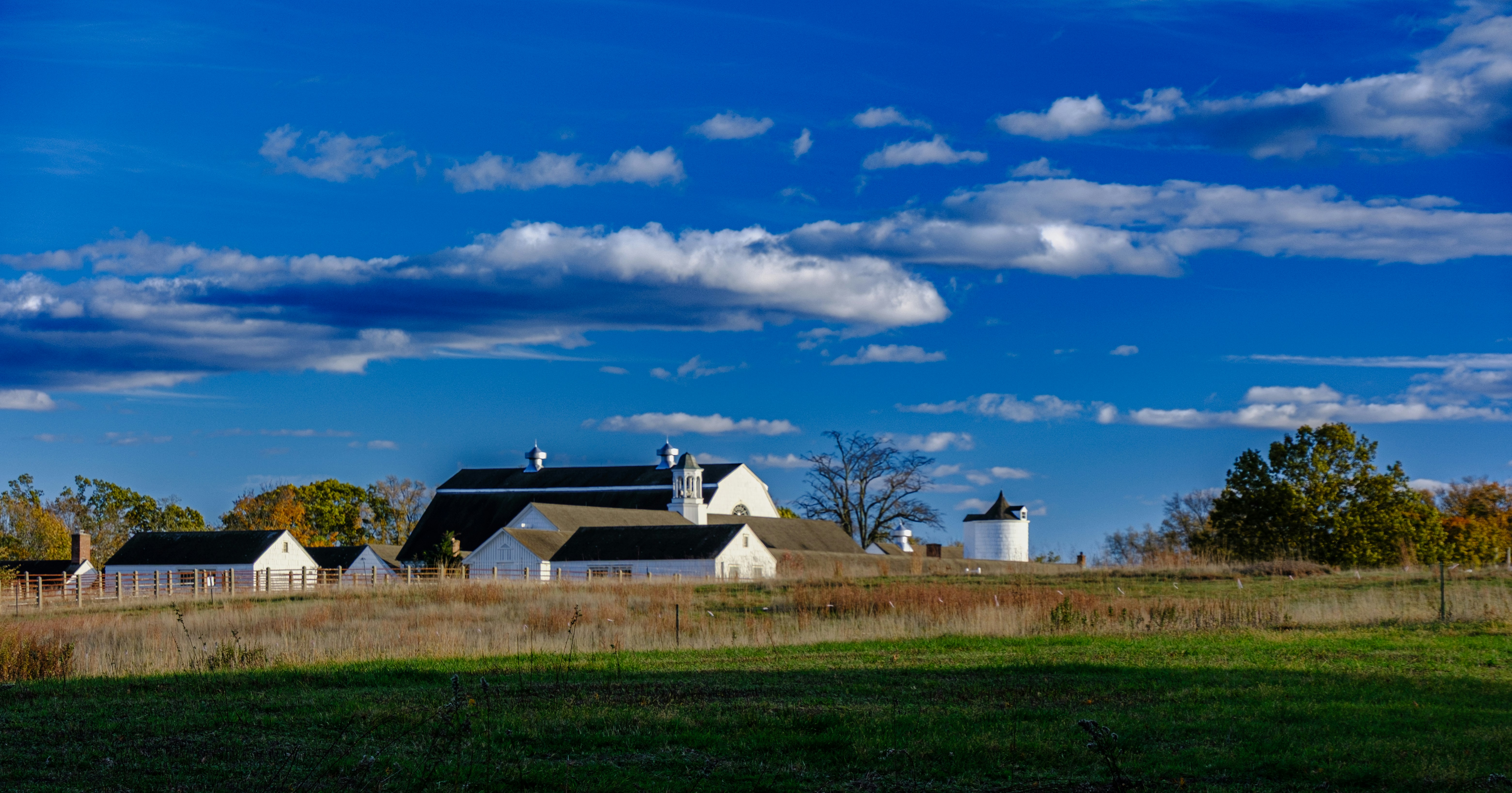 Cloud-Sculpted Sky Over a Quiet Midwest Farmstead