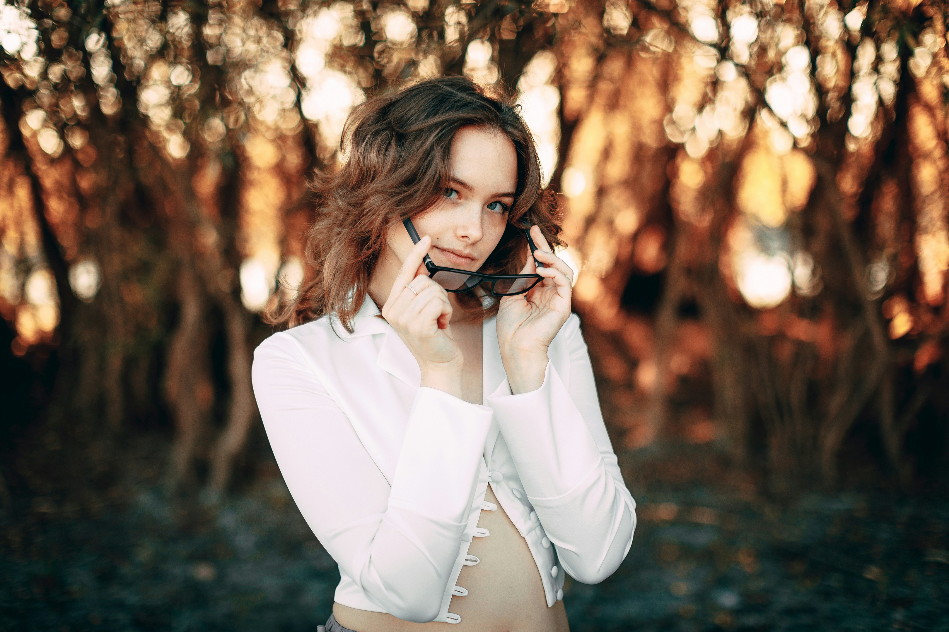 Amber Hour Portrait: Quiet Gaze in a Backlit Forest