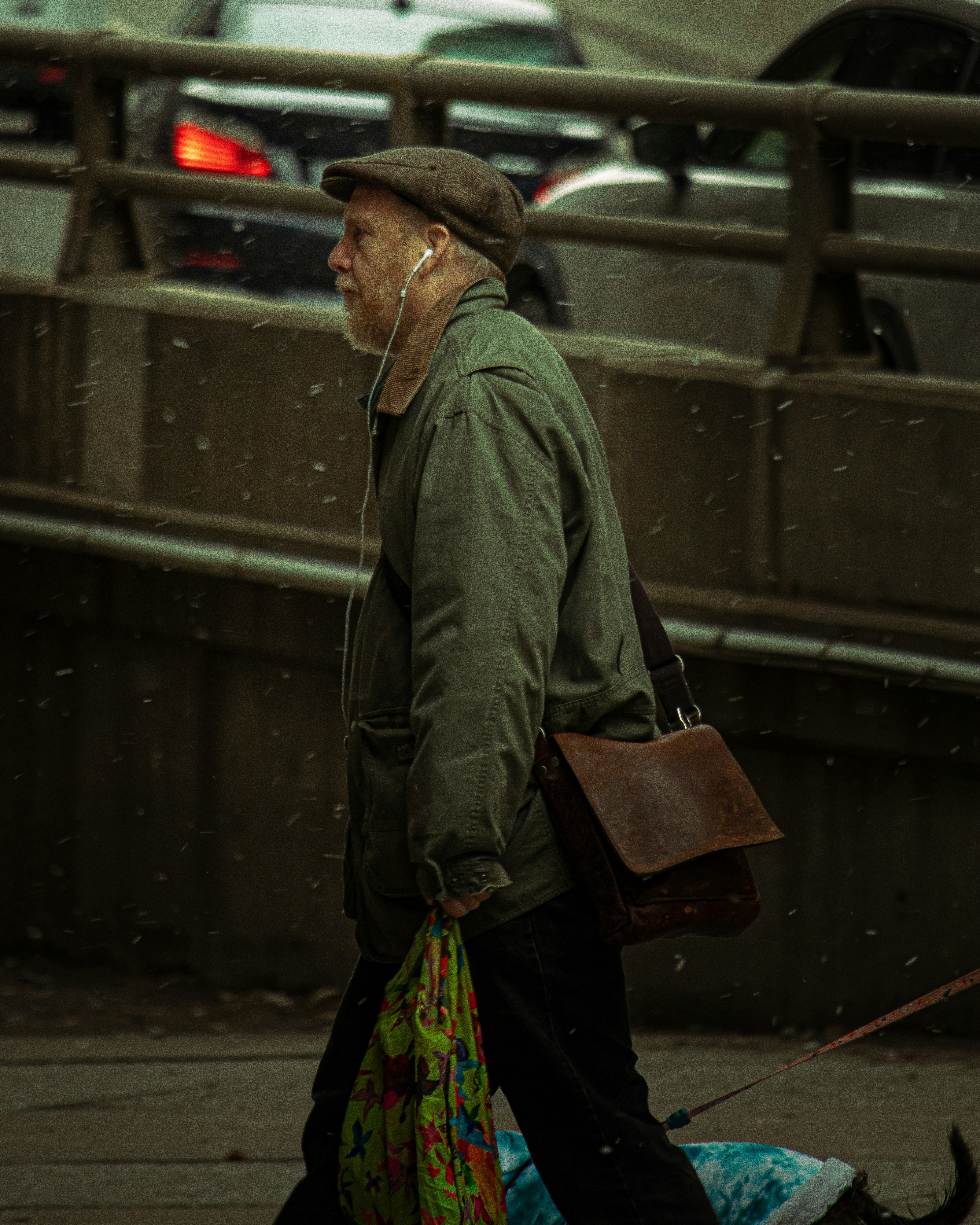 Urban Drizzle: A Quiet City Stroll with a Leather Messenger