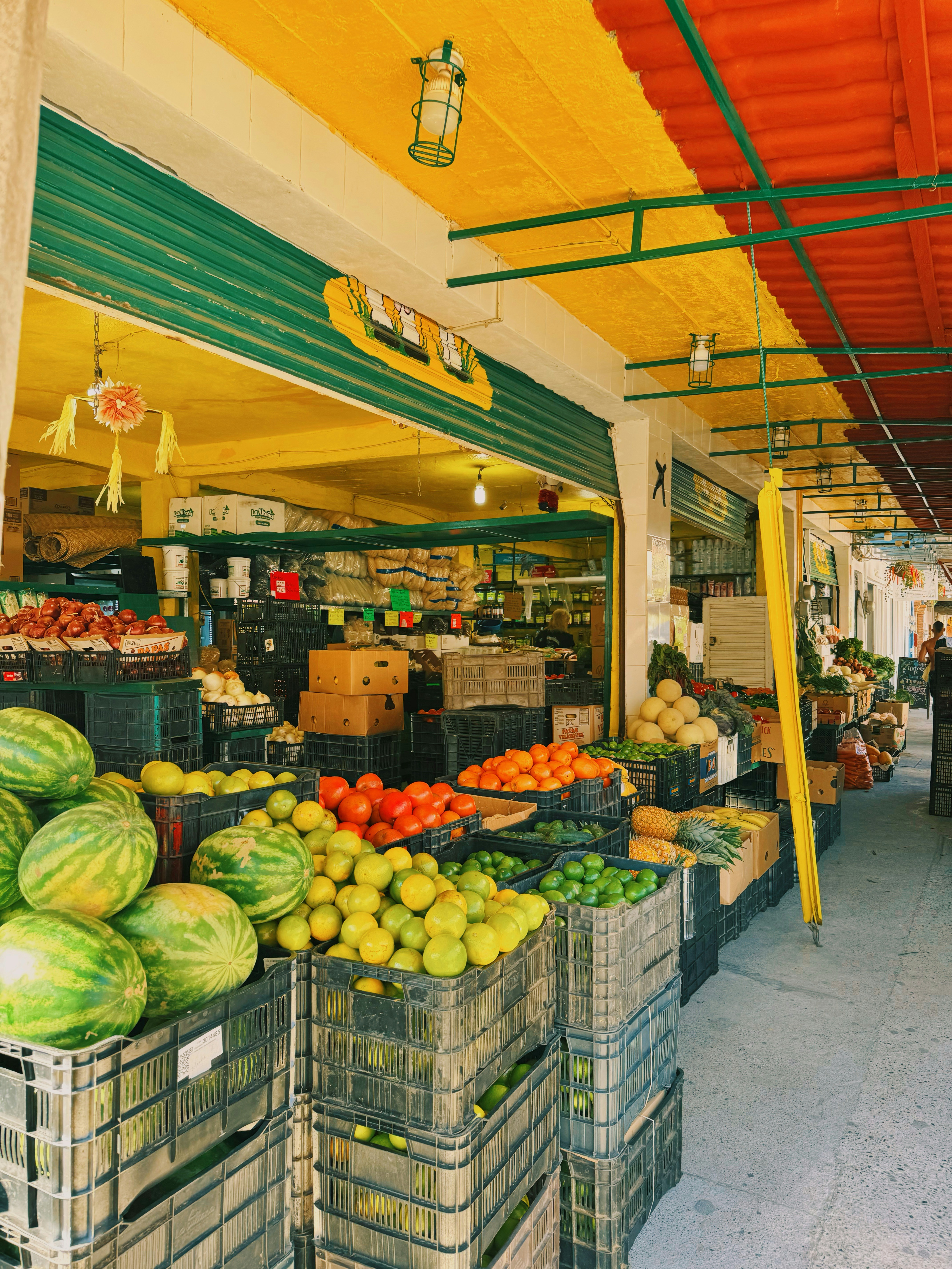Under a Tangerine Canopy: A Lively Produce Market Portrait