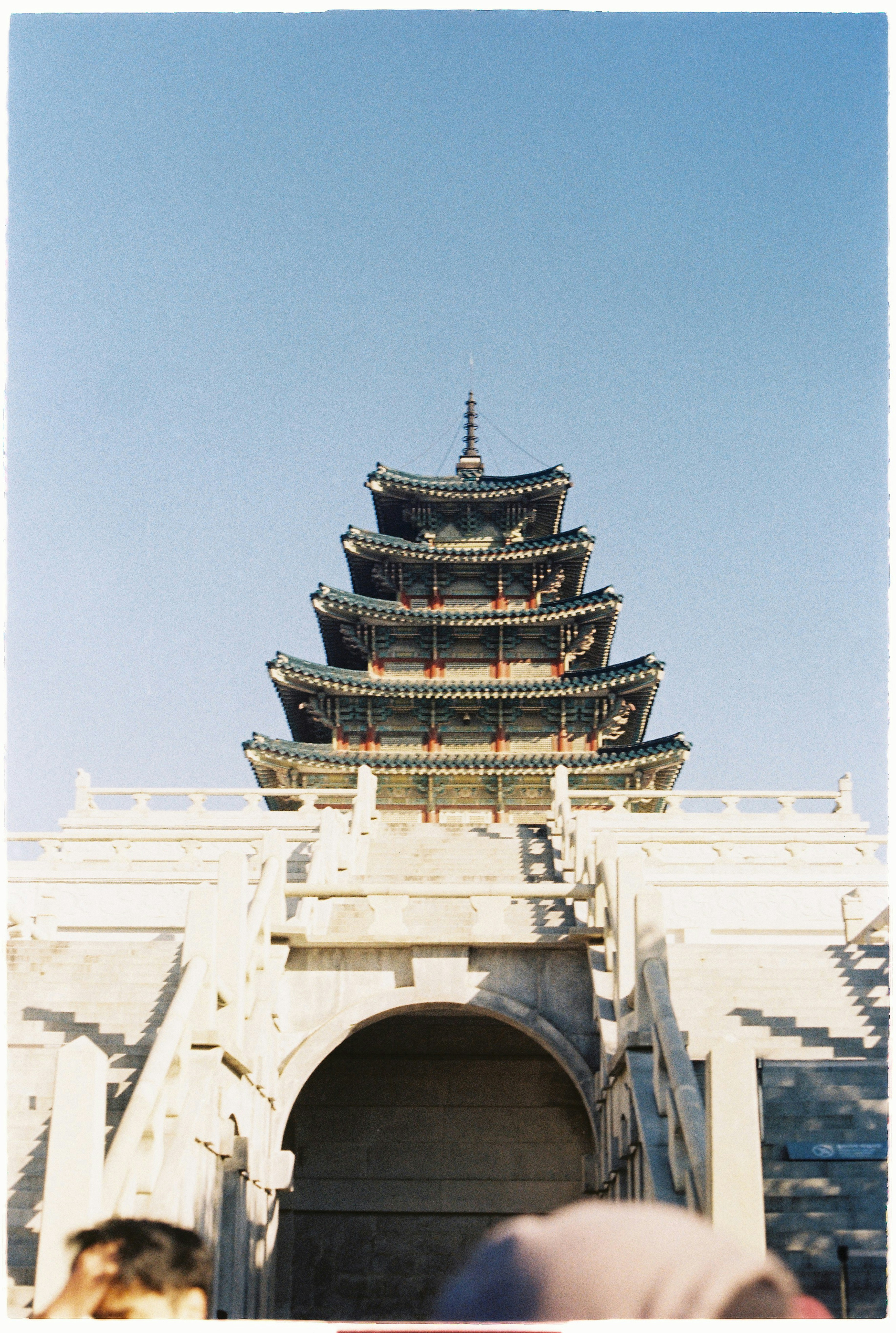 Ascending Stone: A Temple Tower Reaching Toward a Clear Sky