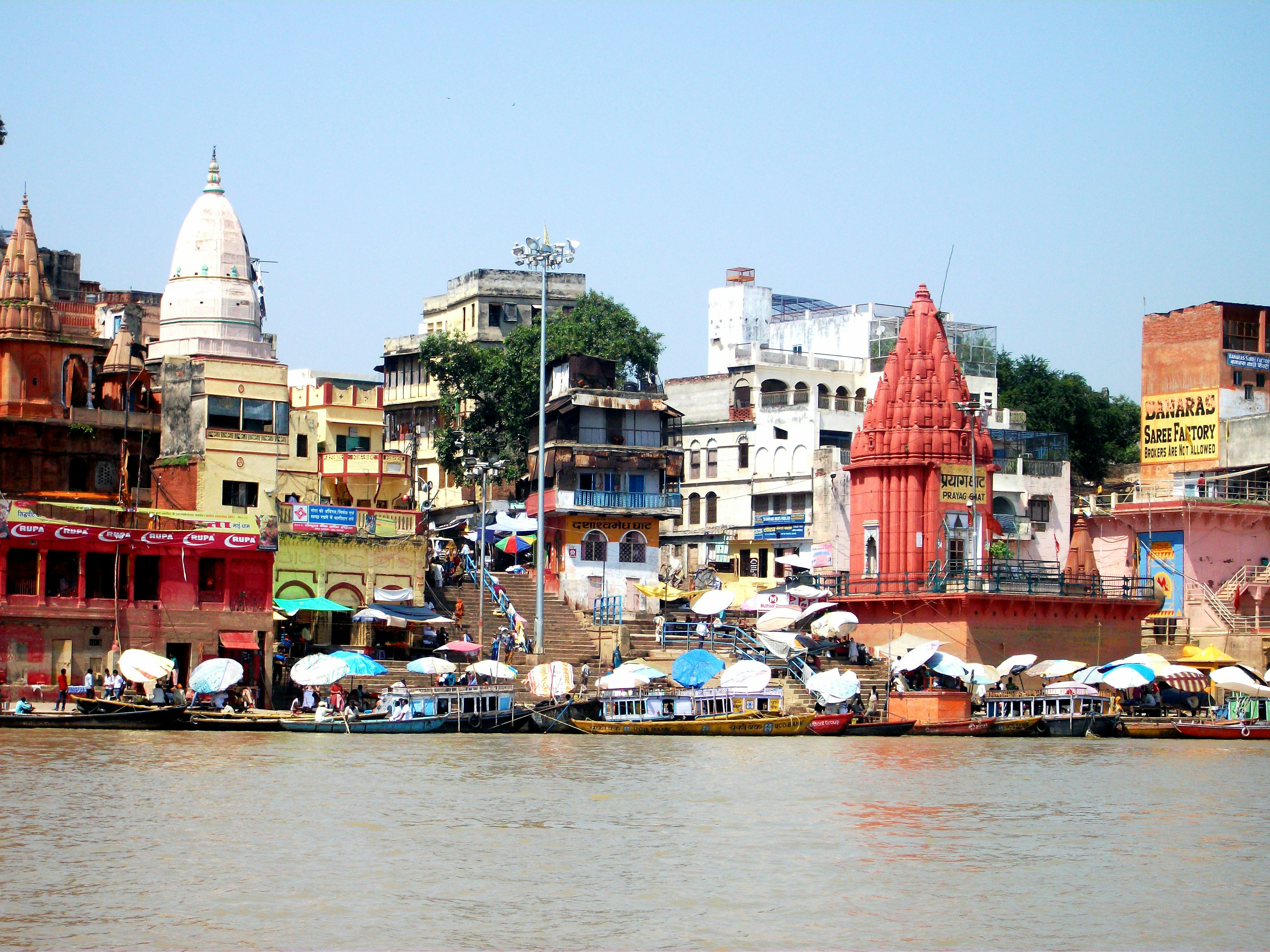 Varanasi is the first and last City on Earth. Every Day Many Pilgrims and Devotees from All Around the World Visit Varanasi (Khaasi). People Take Bath on the Ghats of Varanasi in the Holy River Ganga and Worship the Destroyer Shiva. Kala Bhairav is the Protector of this City. Ganga Devi, The Mighty Godess Force of Sacred Water from Heaven to Earth. To Control Her Flow Smoothly to Earth The God of Destroyer Shiva, kept Ganga Devi on his Head and Opened a Small Hair Lock in Which the Flow of Ganga Devi was controlled smoothly to earth. Ganga Devi is considered the Holy River of Earth.